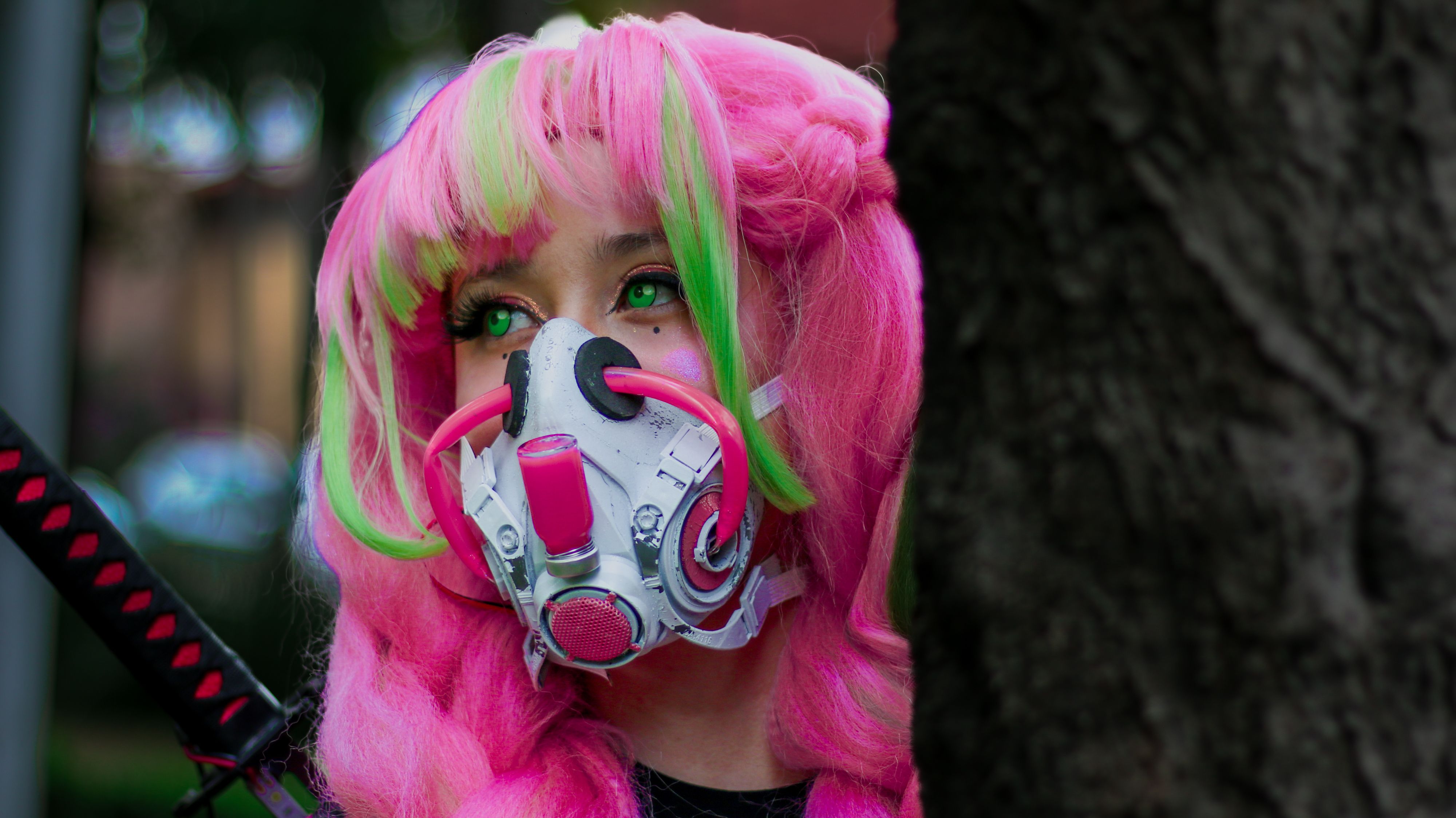 Vibrant Cosplay Character with Mask Outdoors · Free Stock Photo