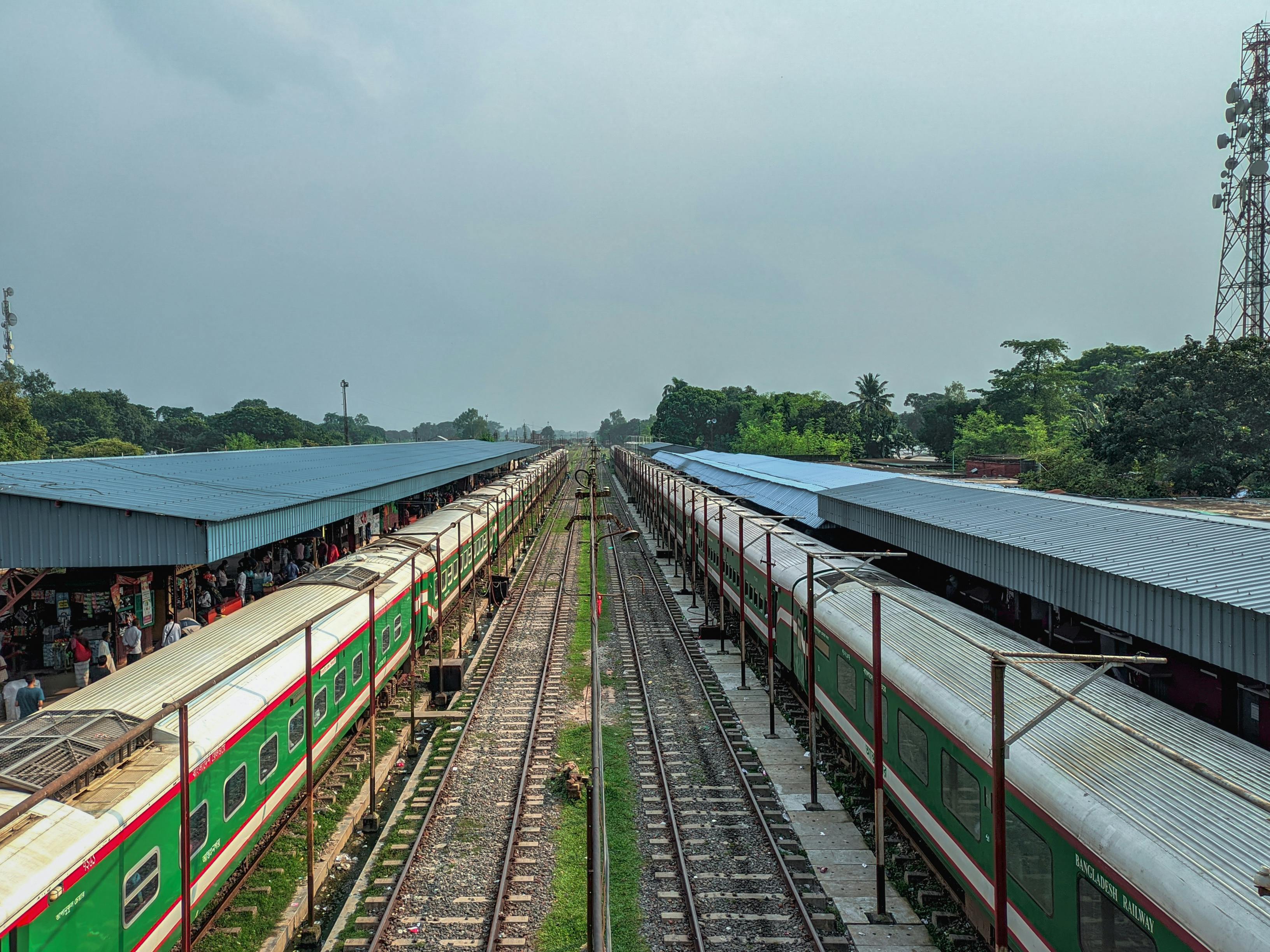 Busy Train Station with Multiple Trains · Free Stock Photo