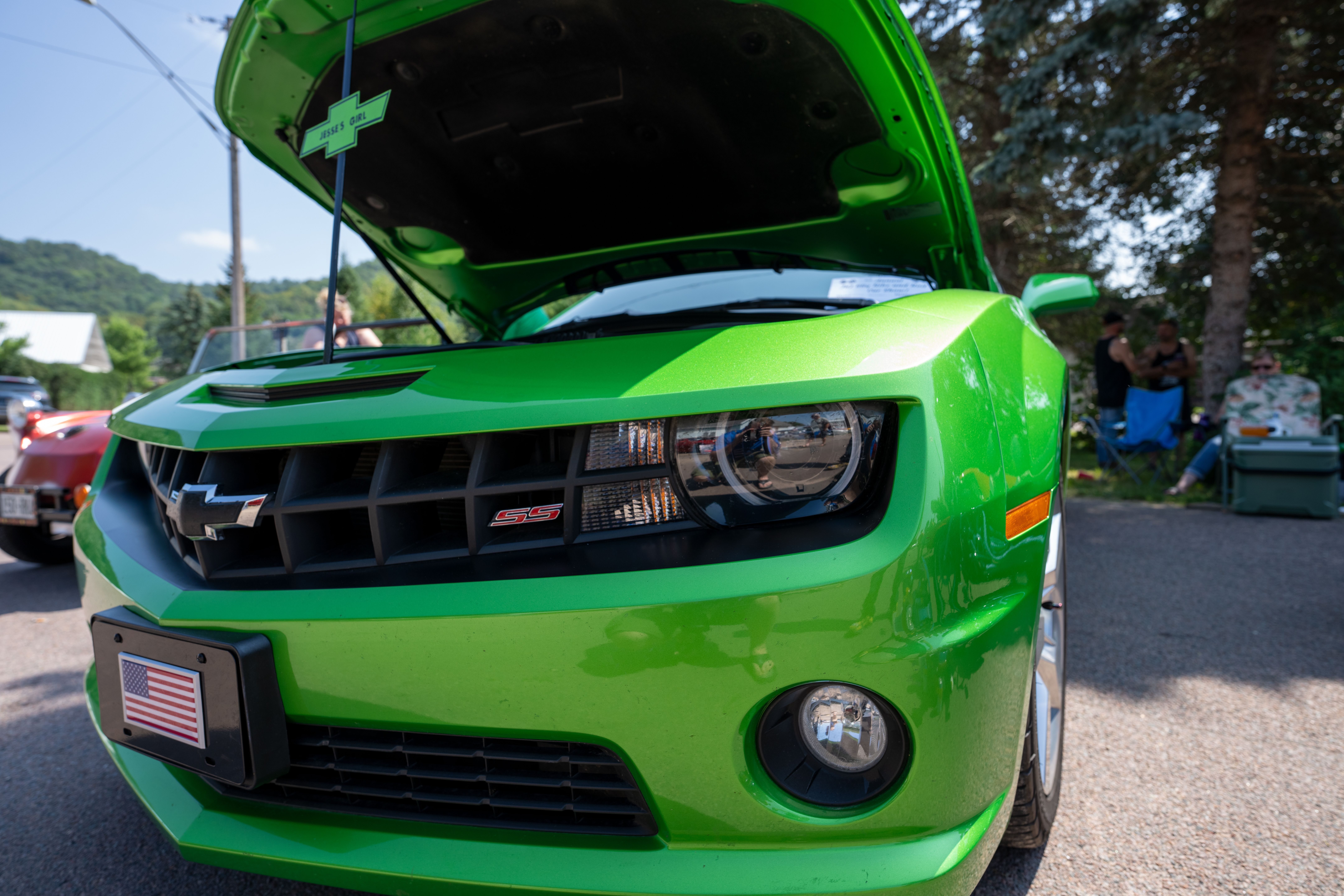 Vibrant Green Chevrolet Camaro at Car Show · Free Stock Photo