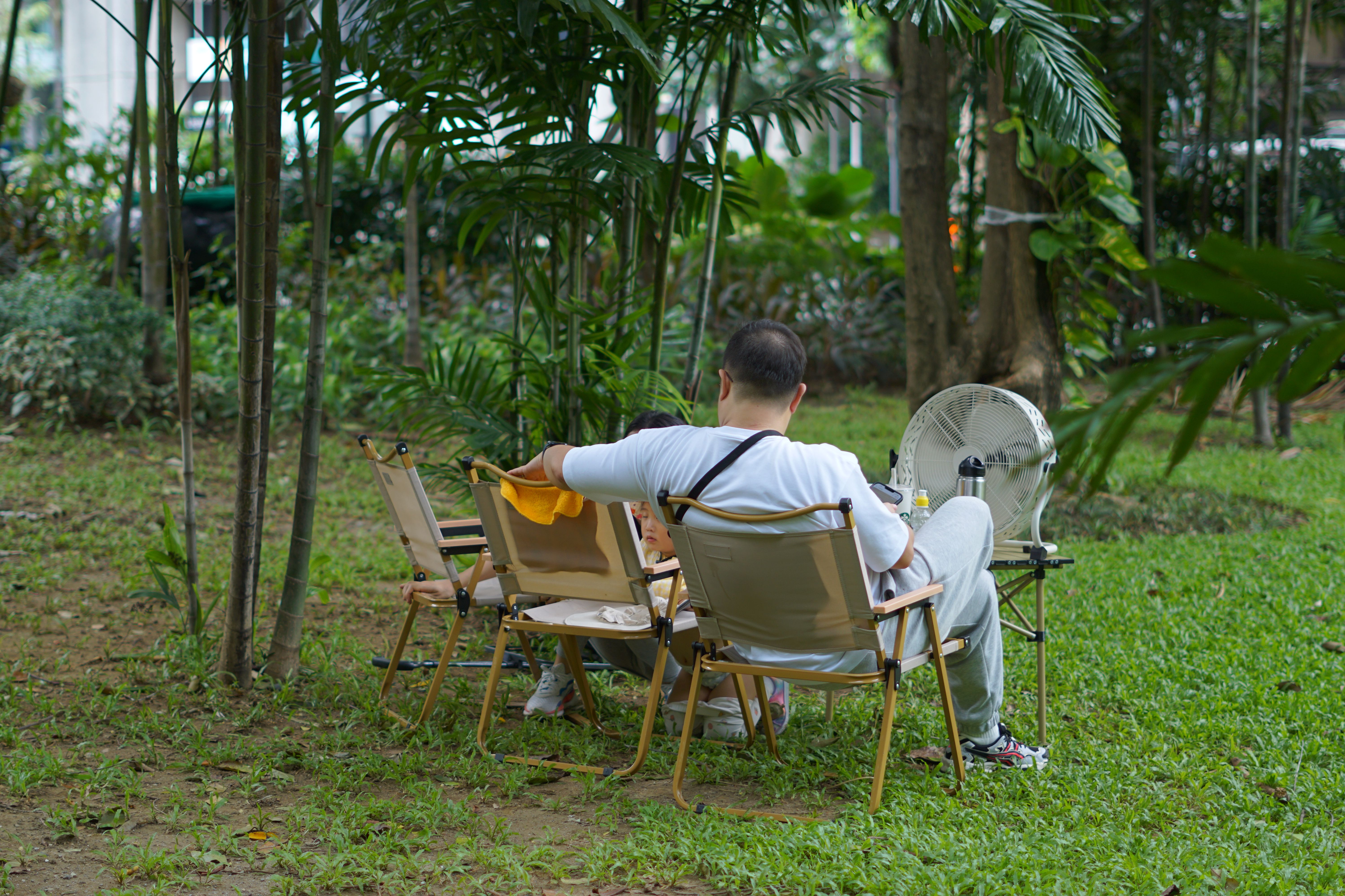 Man Relaxing in Outdoor Garden Setting · Free Stock Photo