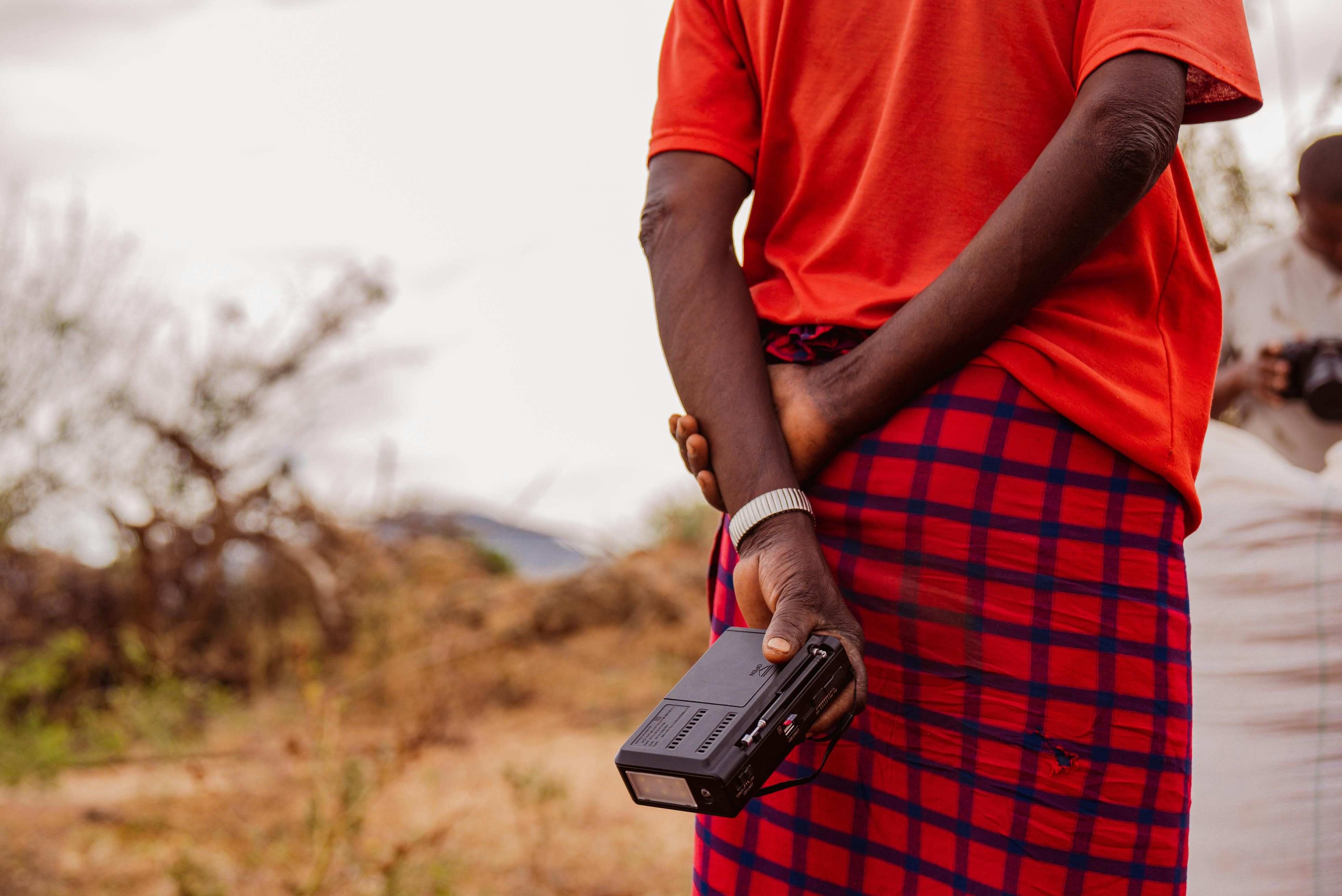 Traditional African Attire and Modern Technology · Free Stock Photo