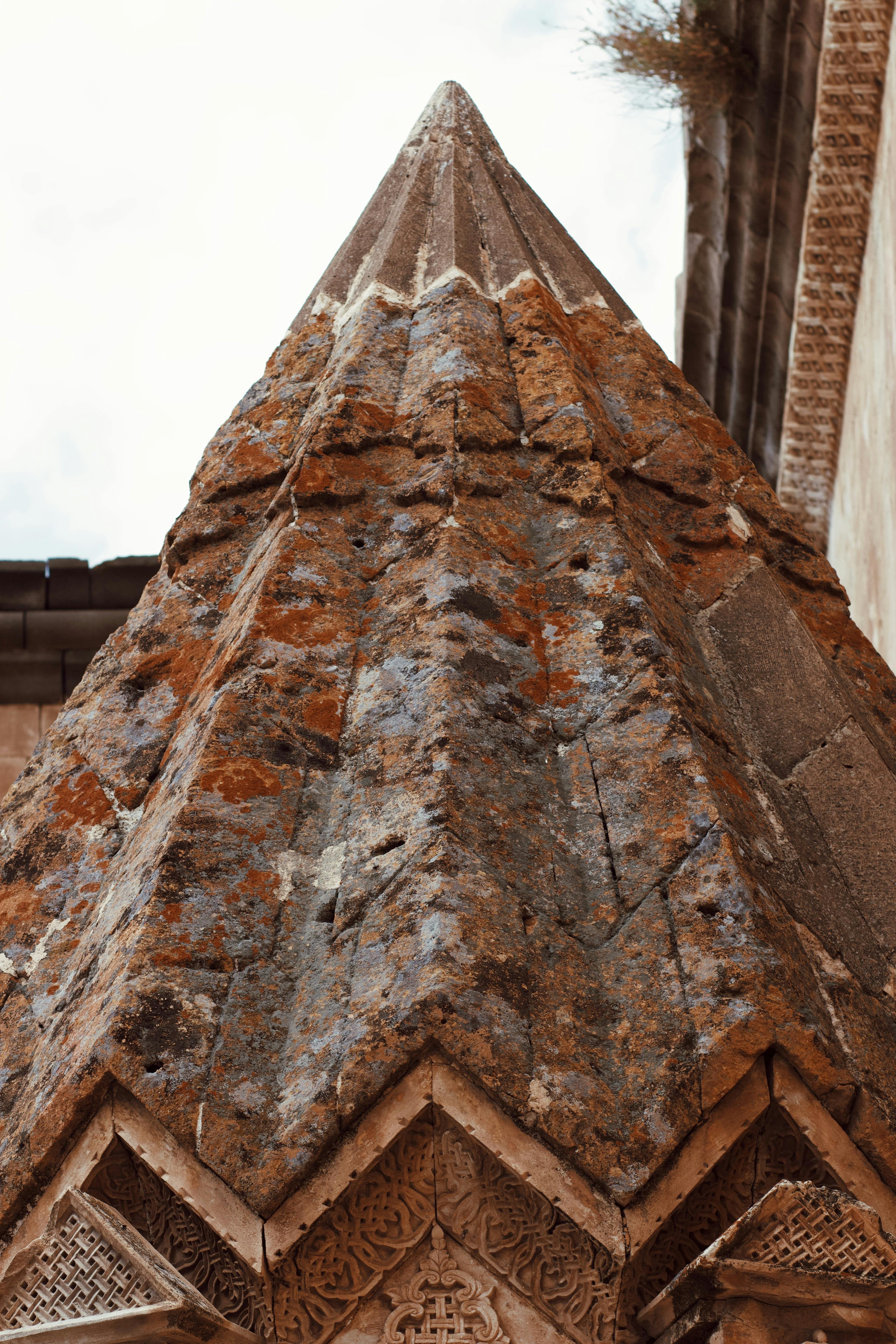 Historic Stone Spire with Architectural Details · Free Stock Photo