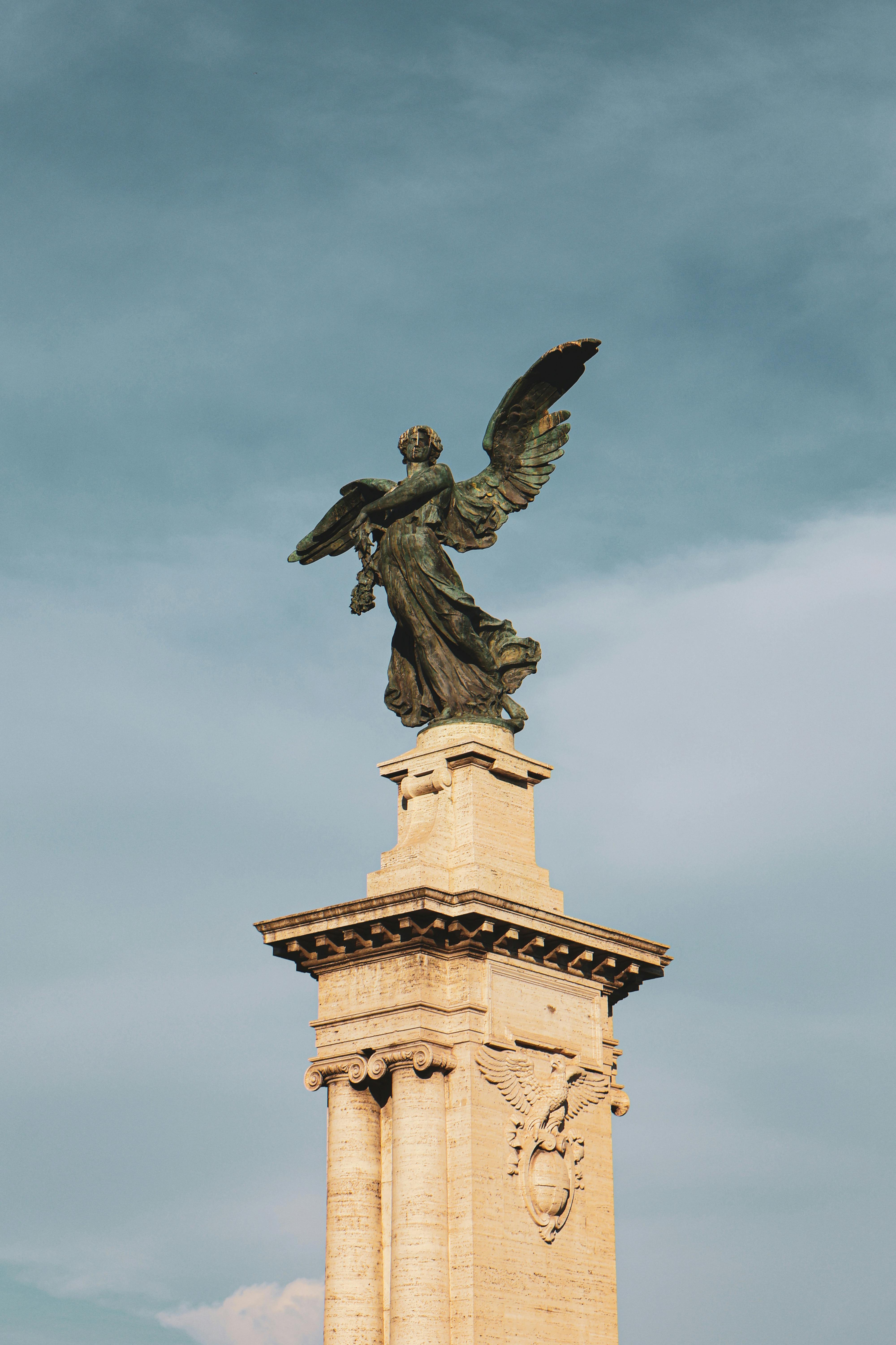Winged Victory Statue in Rome Against Blue Sky · Free Stock Photo