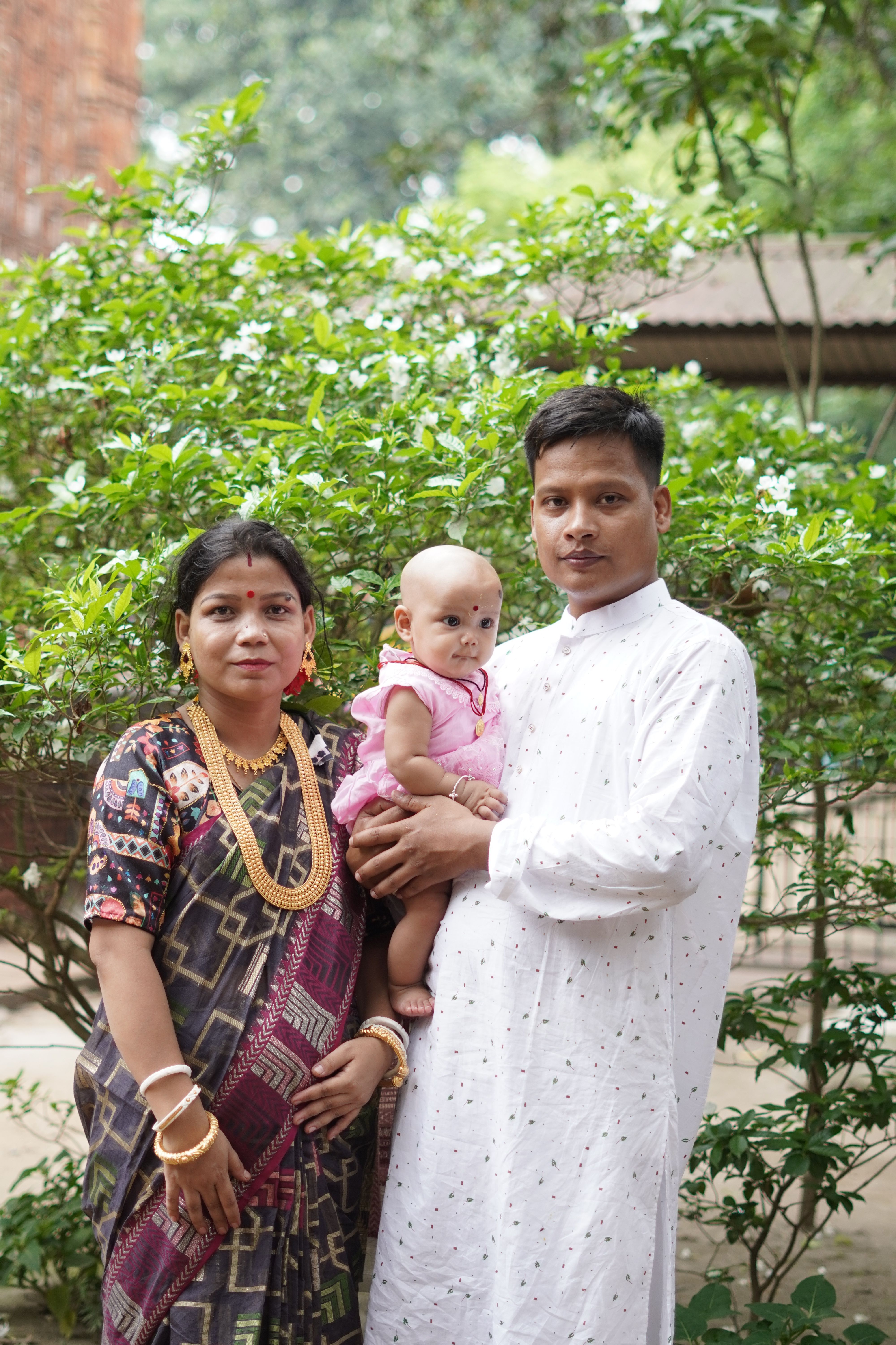 Traditional Bangladeshi Family Portrait Outdoors · Free Stock Photo