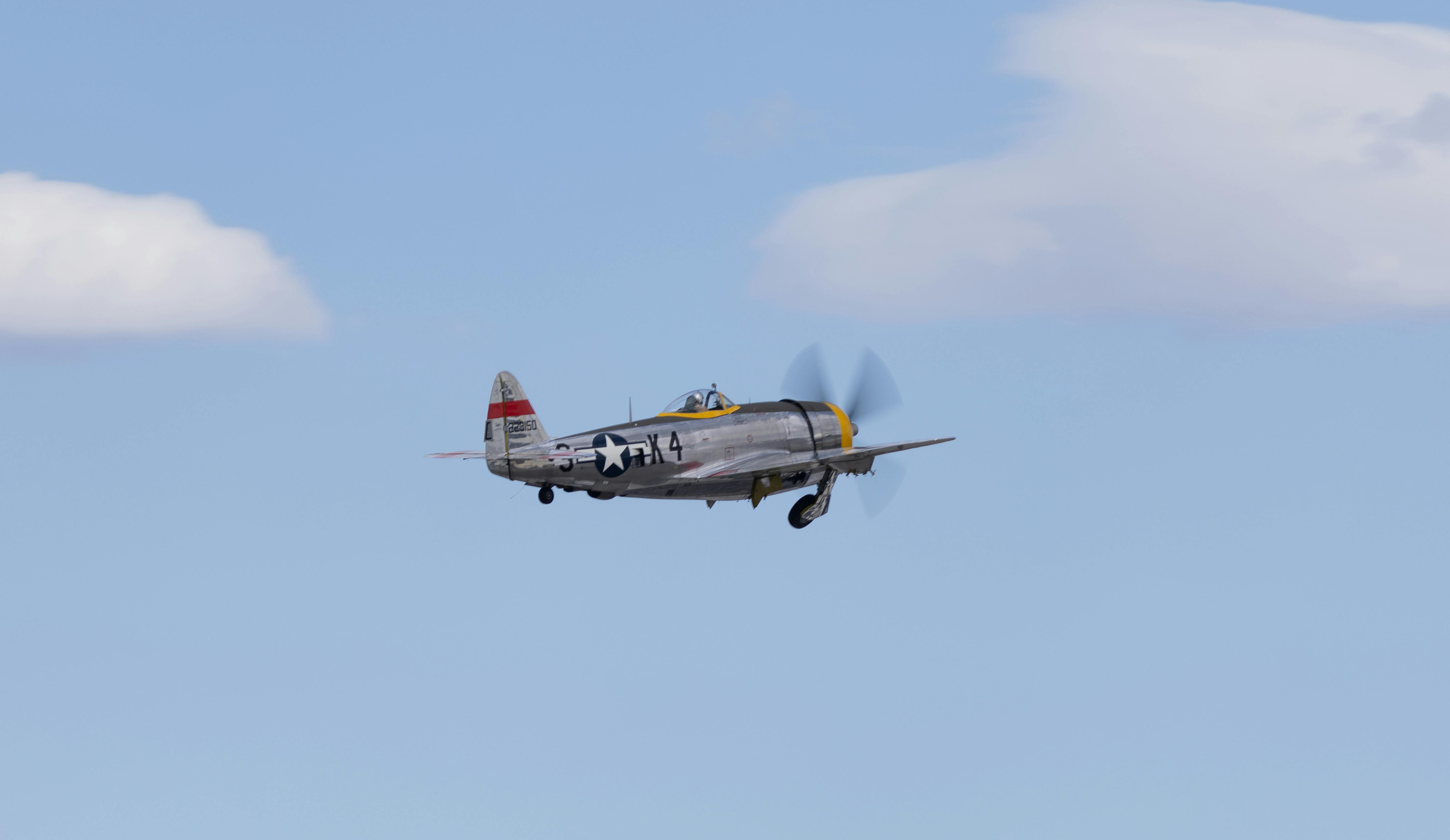 Historic P-47 Thunderbolt in Airborne Flight · Free Stock Photo