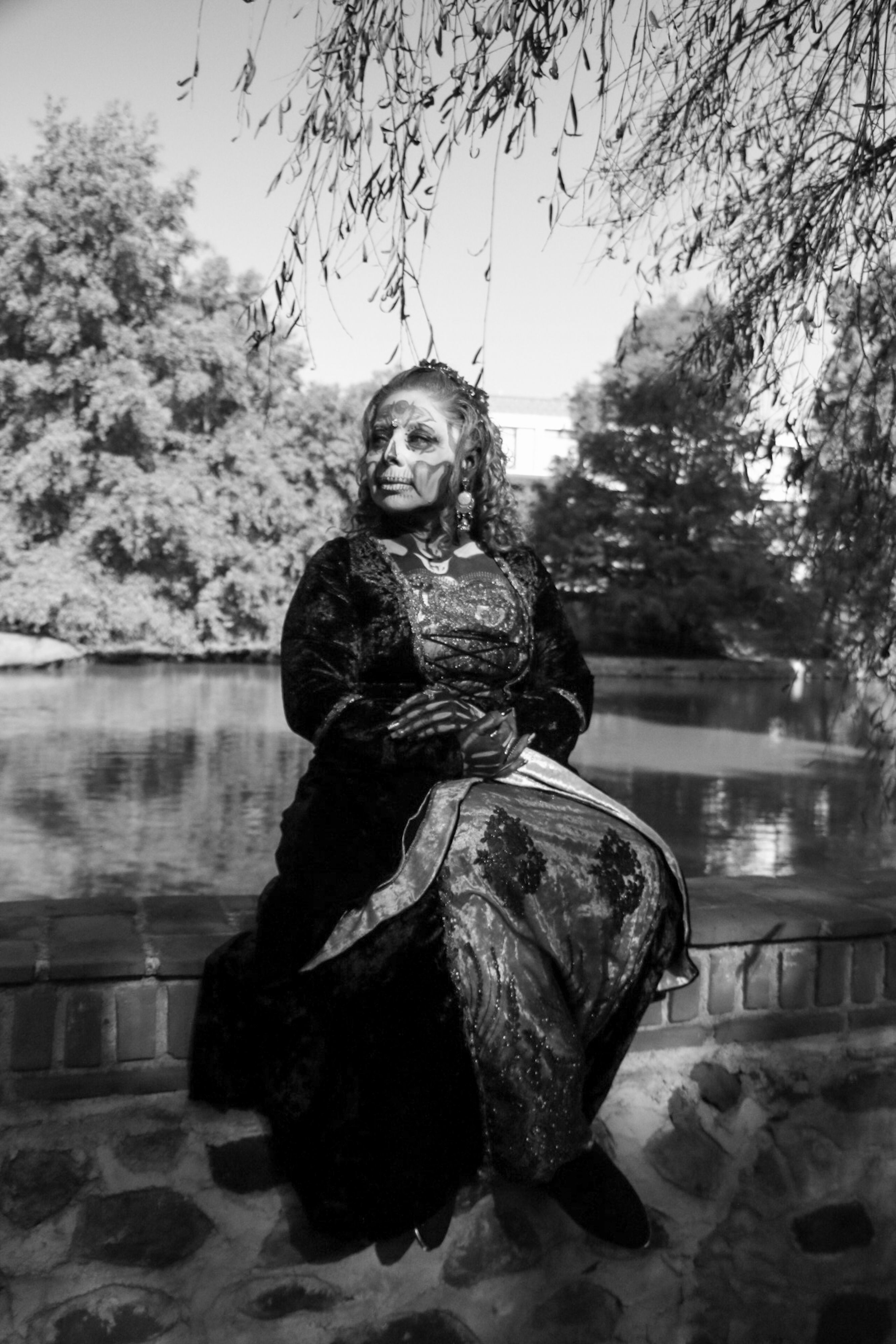 Elderly Woman in Gothic Costume by Lake · Free Stock Photo