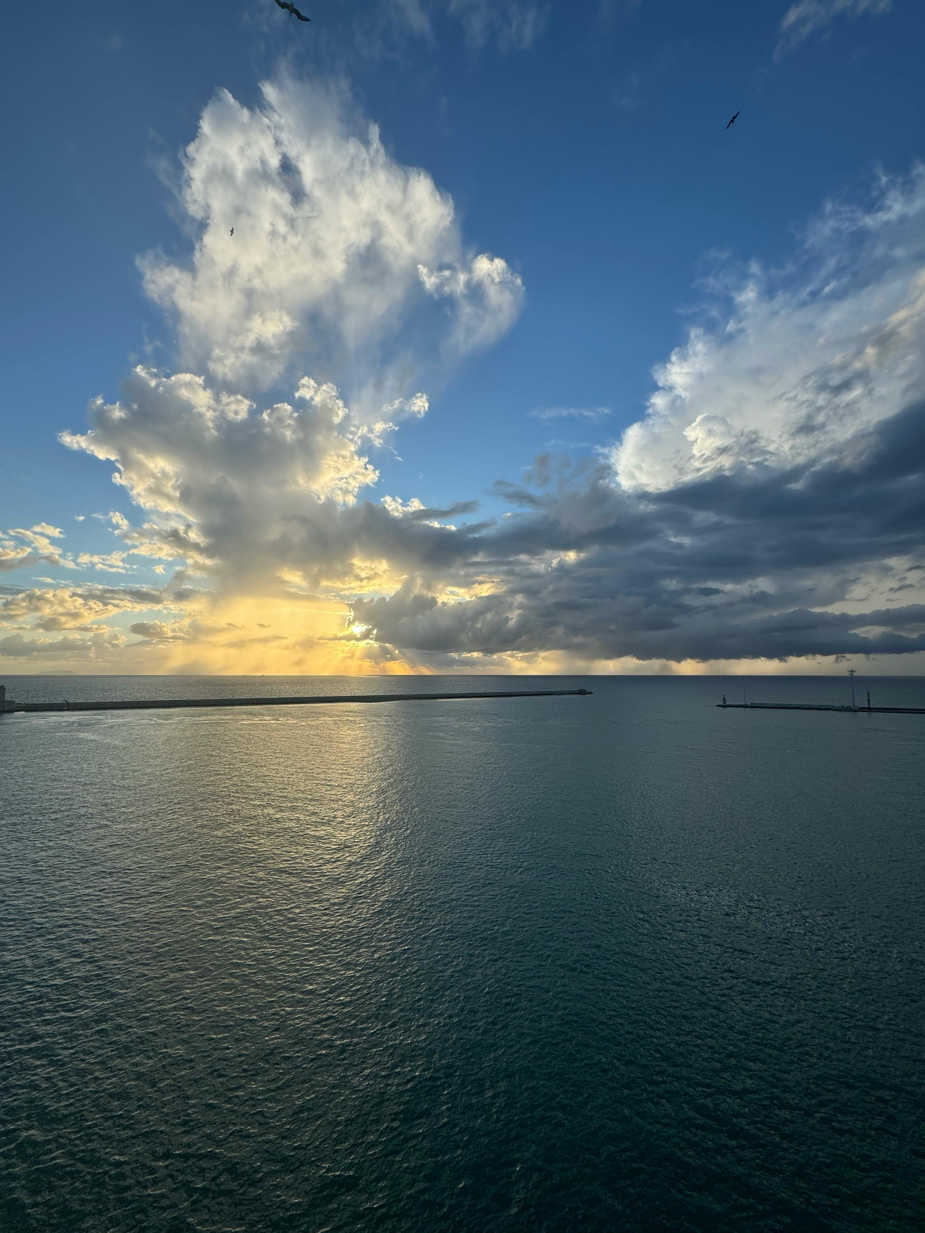 Bird's Eye View of Ocean During Sunset · Free Stock Photo