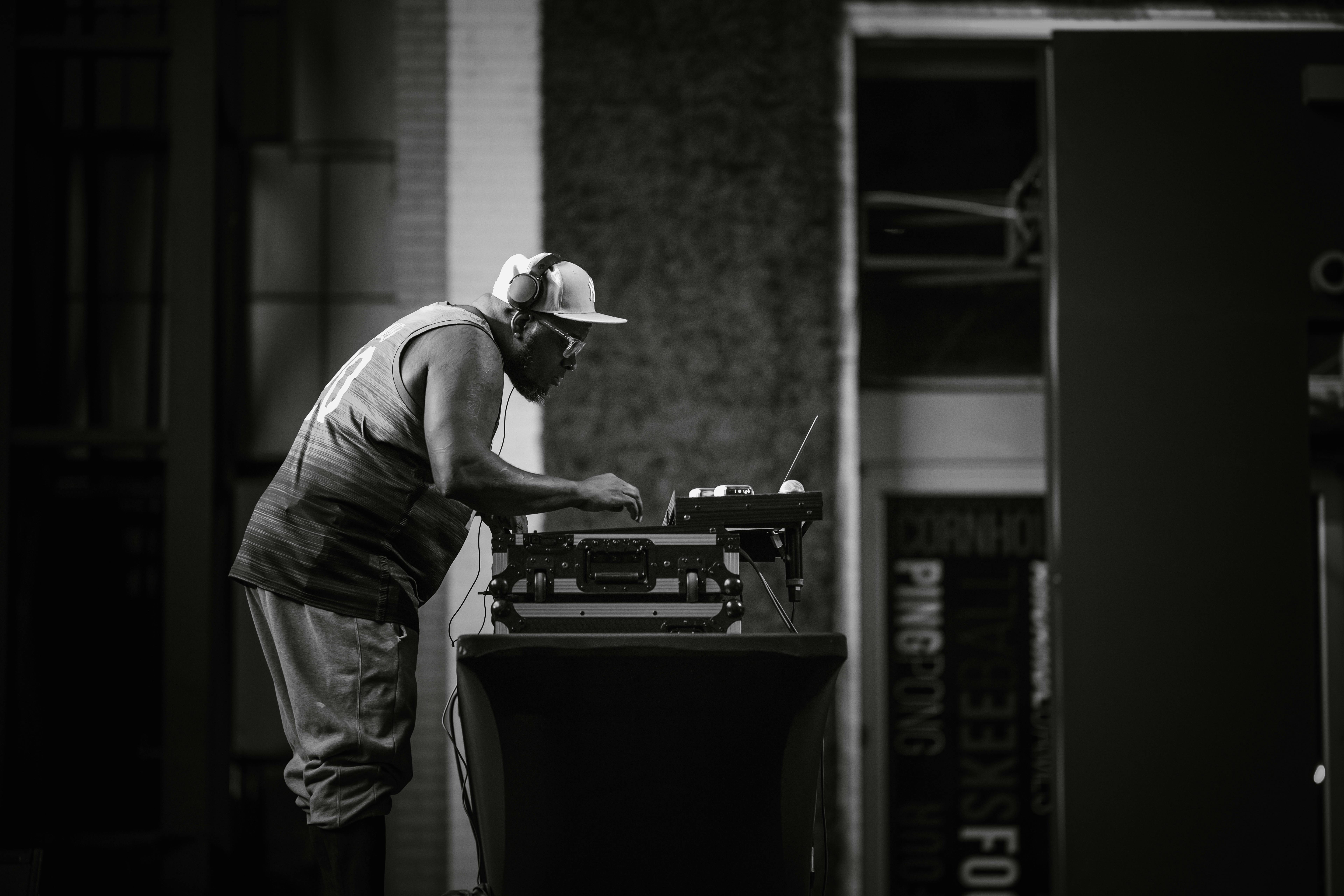 DJ Performing Live Set in Urban Environment · Free Stock Photo