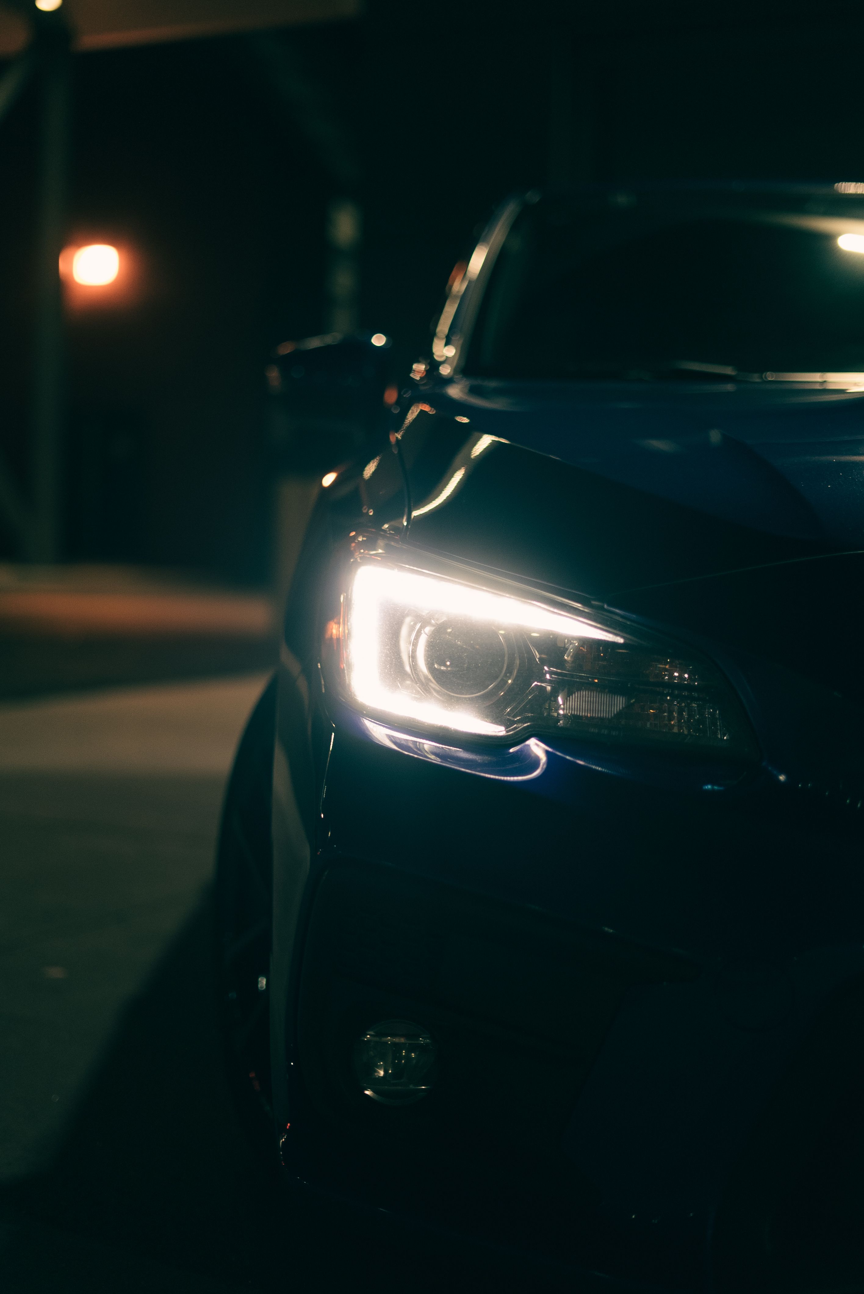 Moody Nighttime Car Headlight Illumination · Free Stock Photo