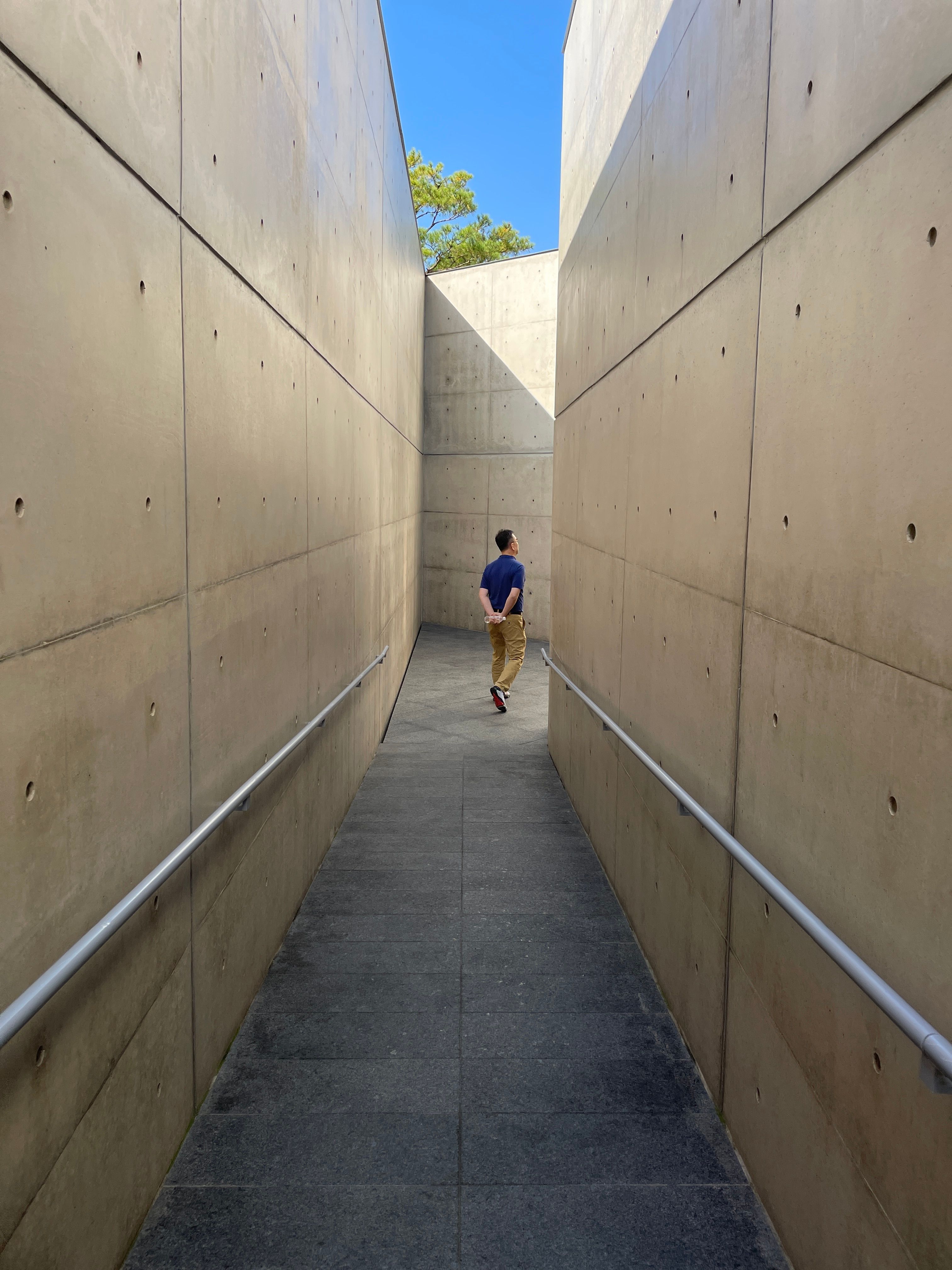 Modern Architecture Alley with Solo Walker · Free Stock Photo