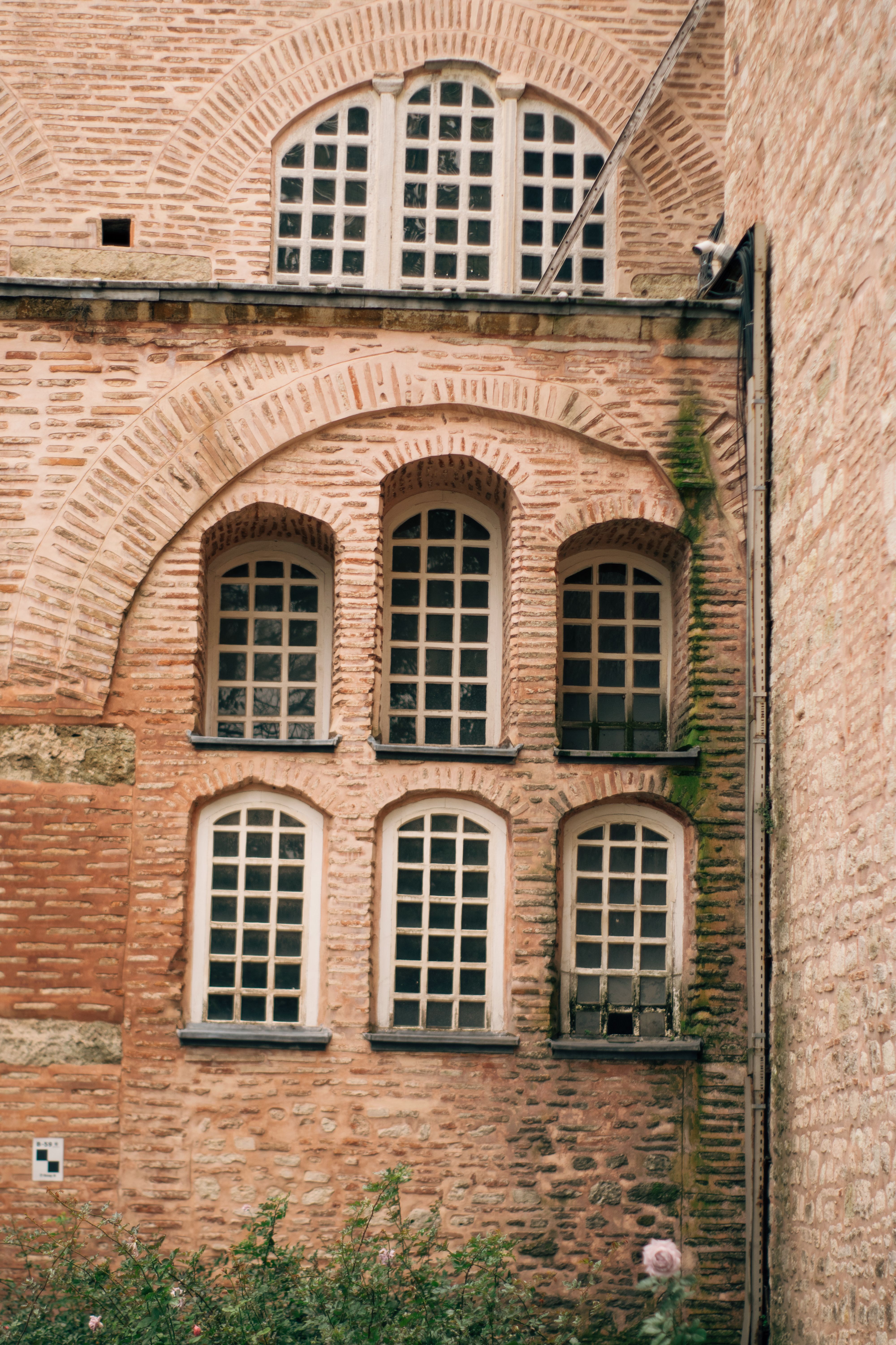 Historic Brick Architecture with Arched Windows · Free Stock Photo