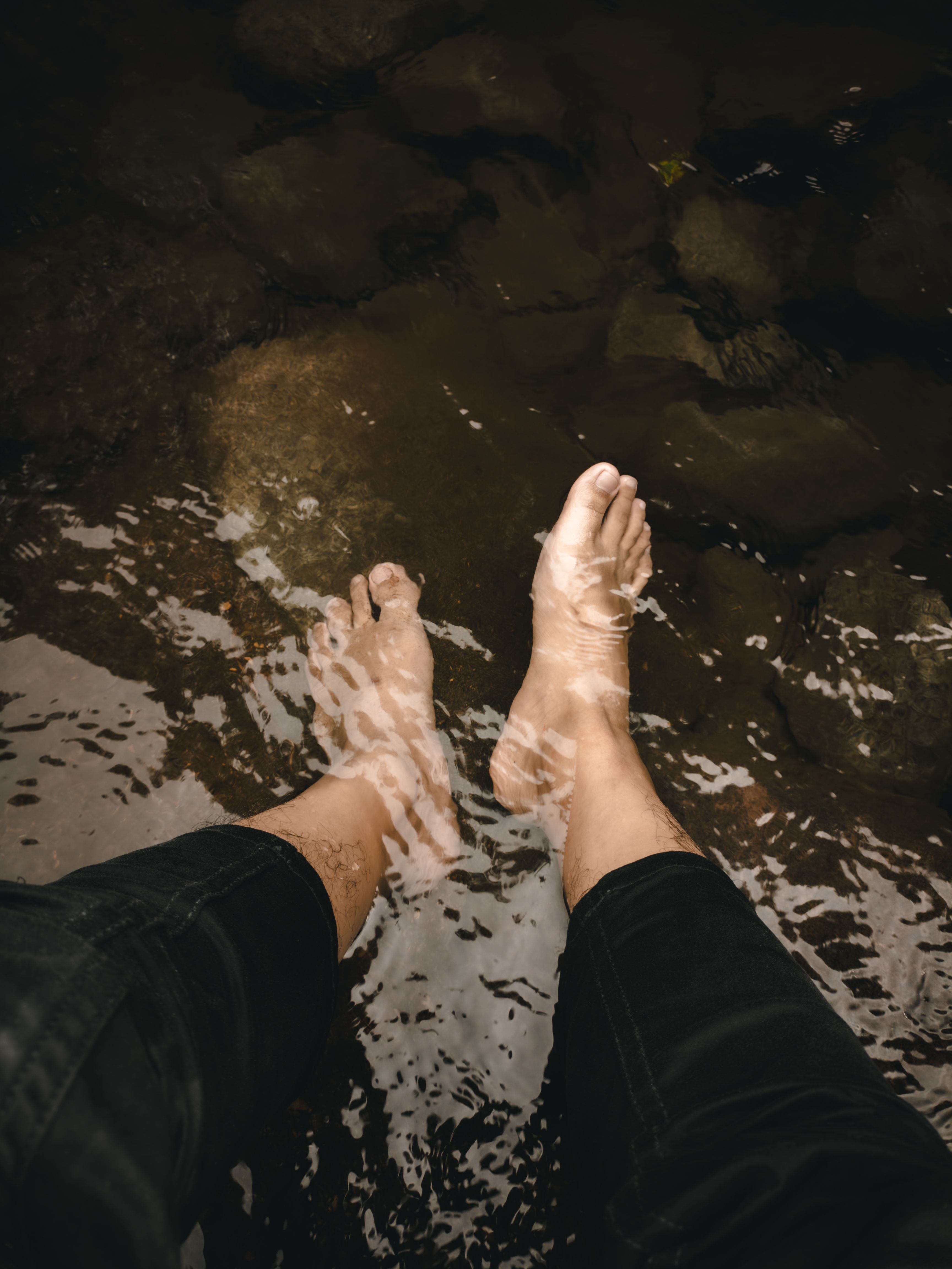 Relaxed Feet in Clear Stream Water · Free Stock Photo