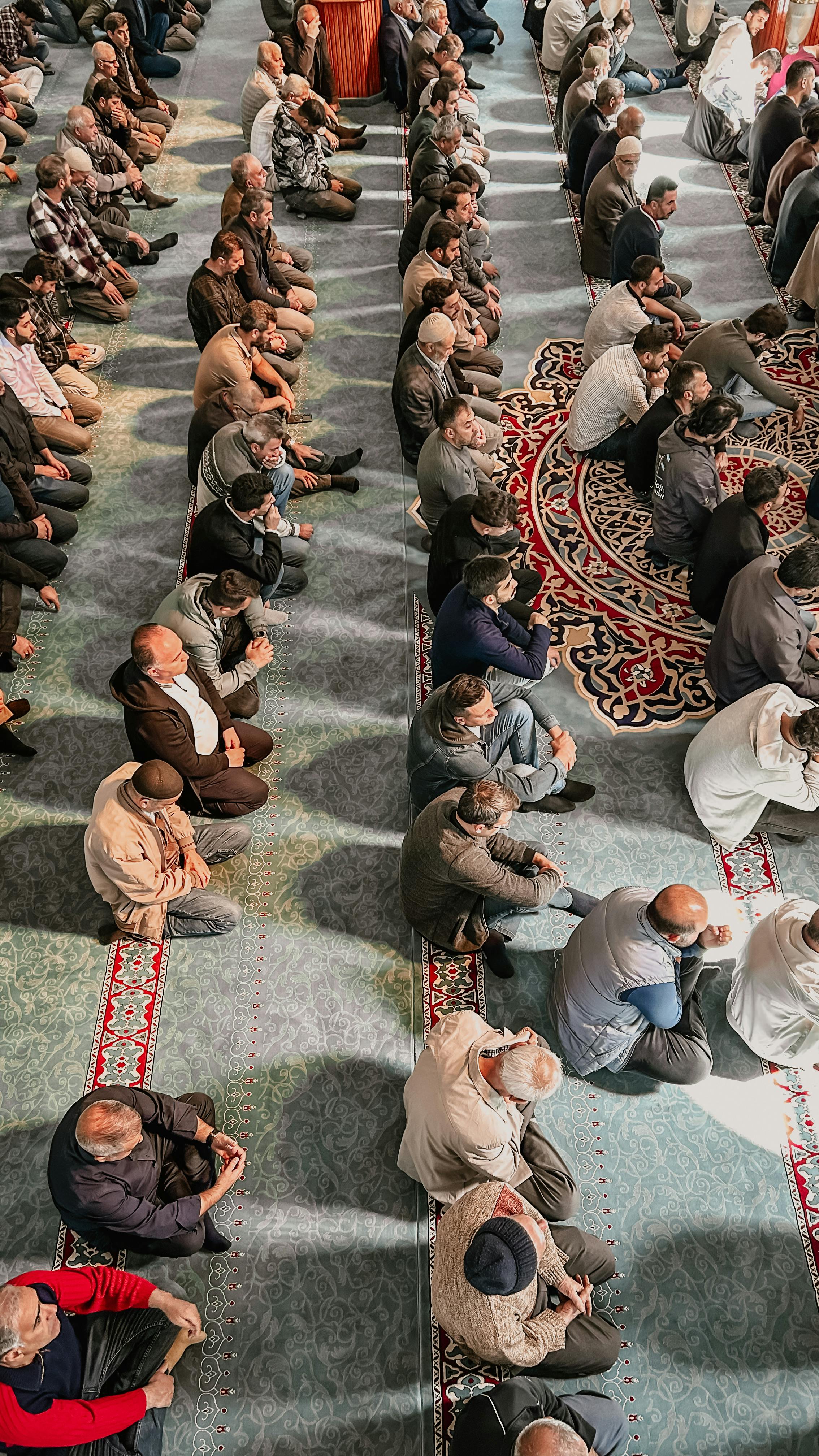 Congregation Praying Inside a Mosque from Above · Free Stock Photo