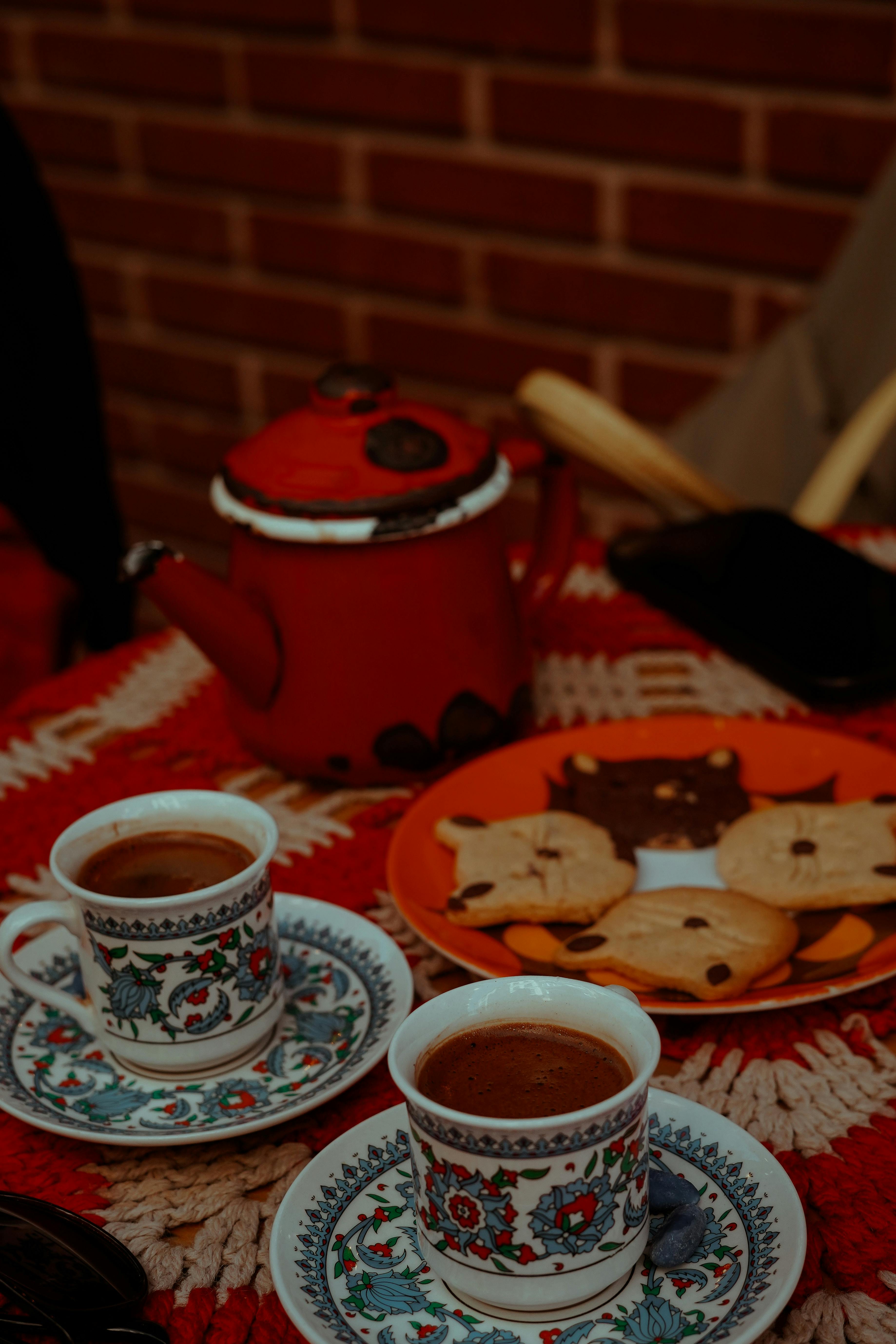 Cozy Tea Time with Cookies and Red Teapot · Free Stock Photo