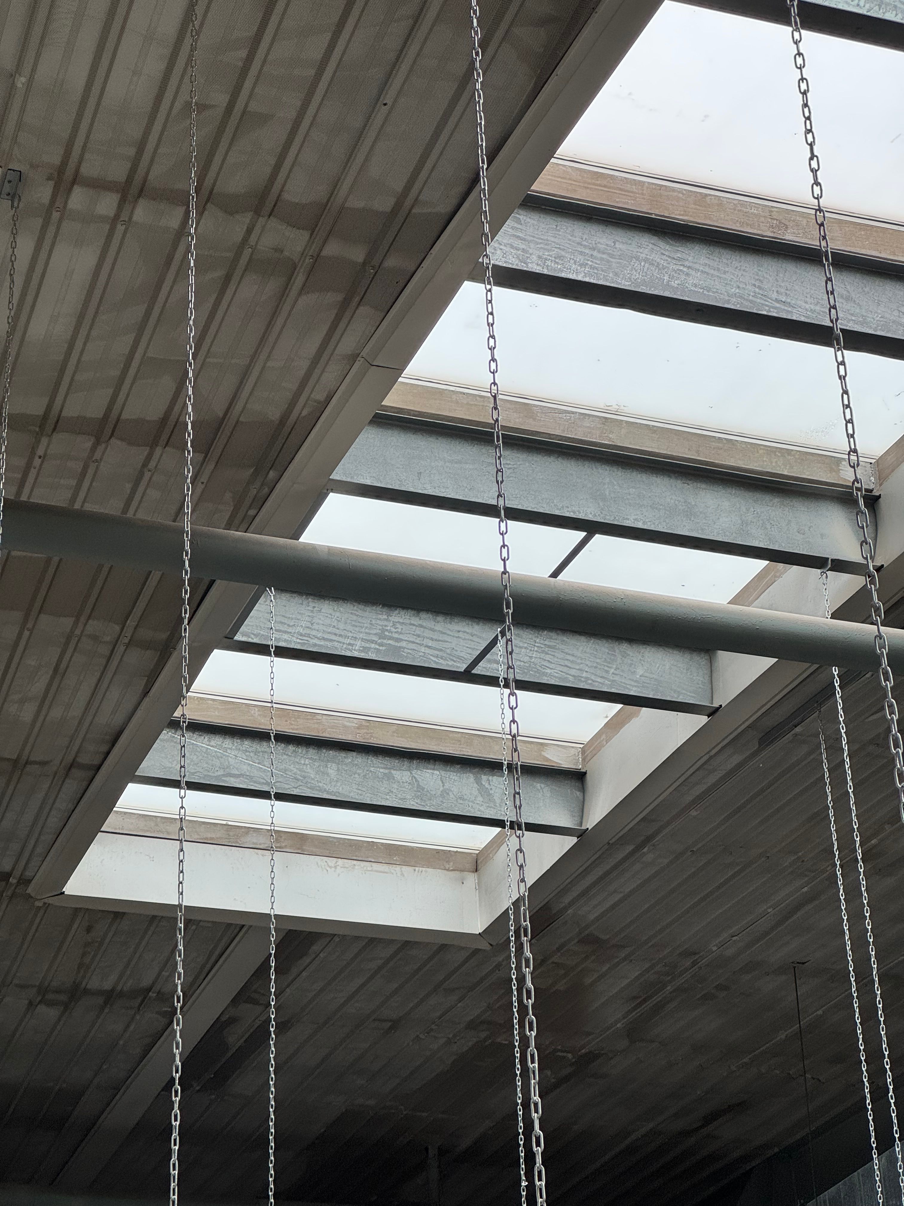Modern Industrial Skylight Design in Warehouse · Free Stock Photo