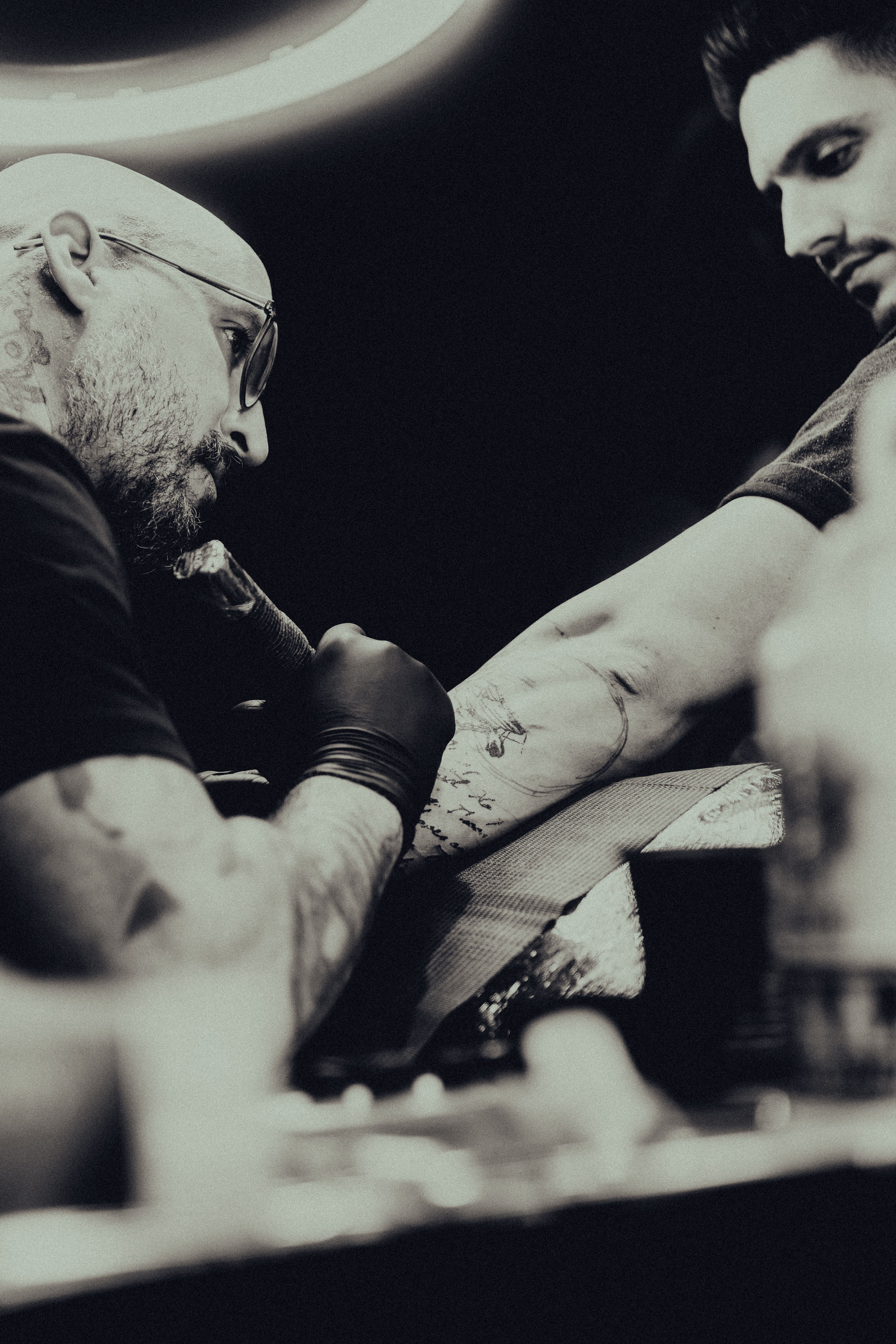 Professional Tattoo Artist in Action at a Studio · Free Stock Photo