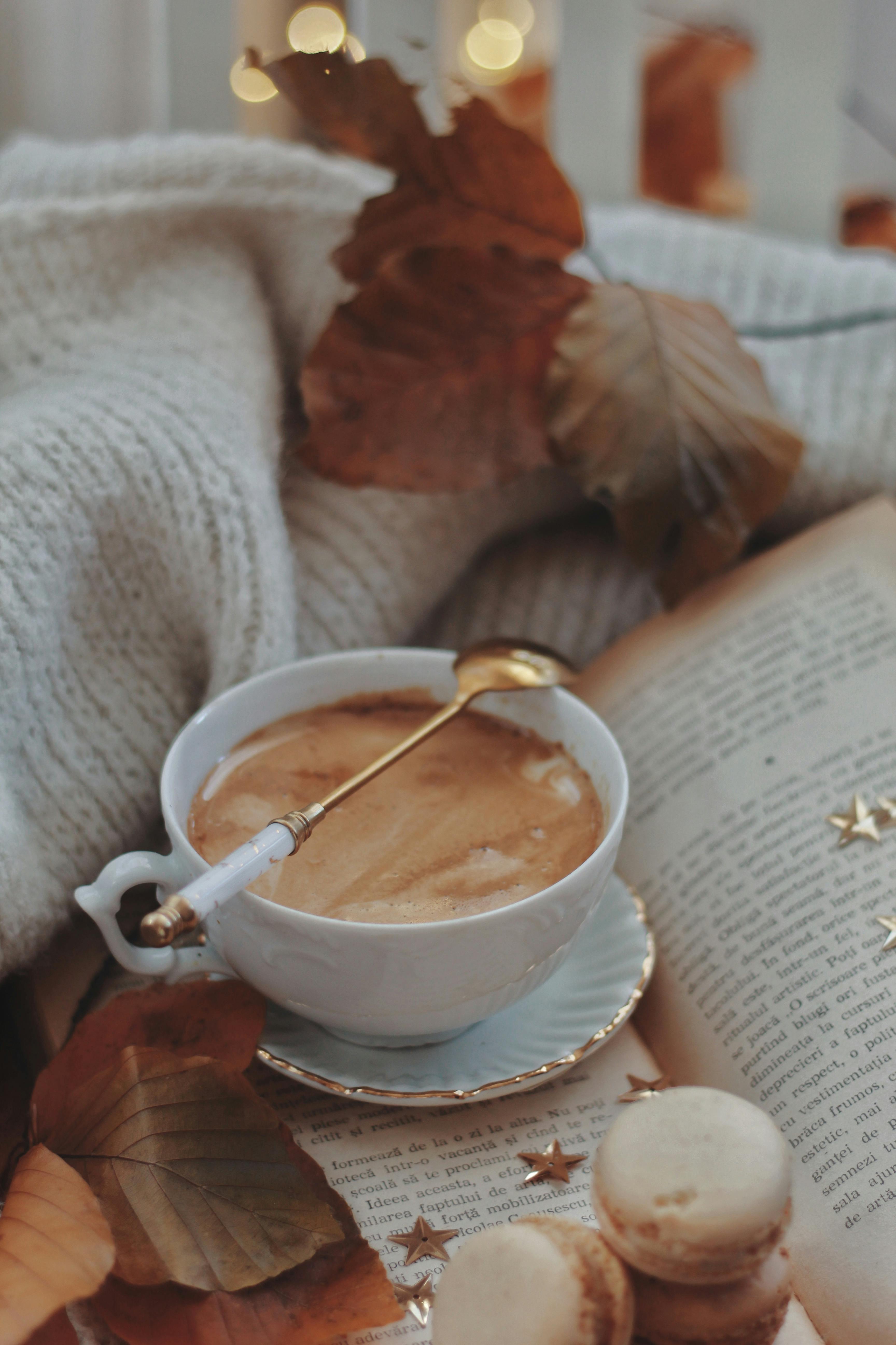 Cozy Autumn Coffee with Book and Macarons · Free Stock Photo