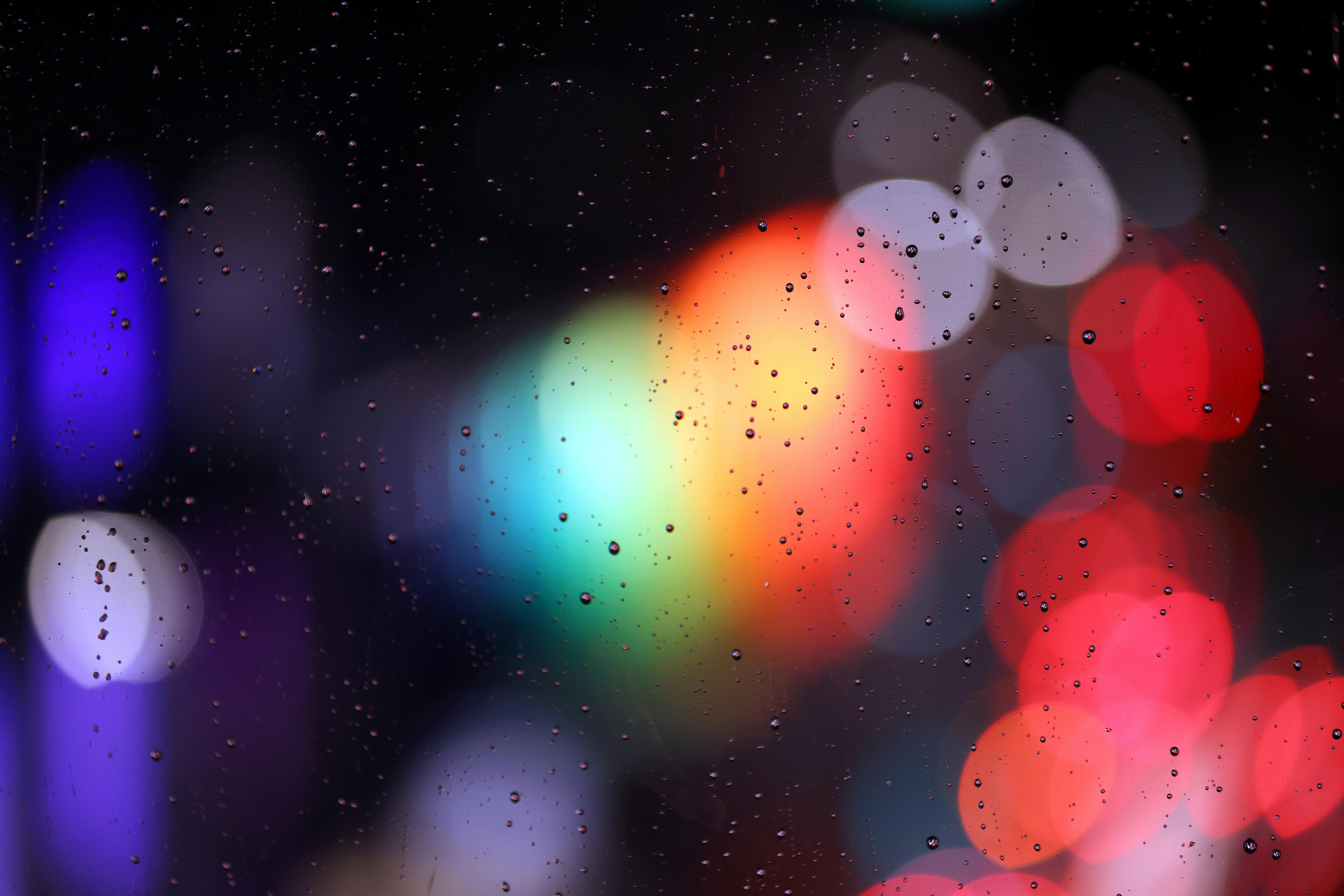 Colorful Bokeh Lights with Raindrop Texture · Free Stock Photo