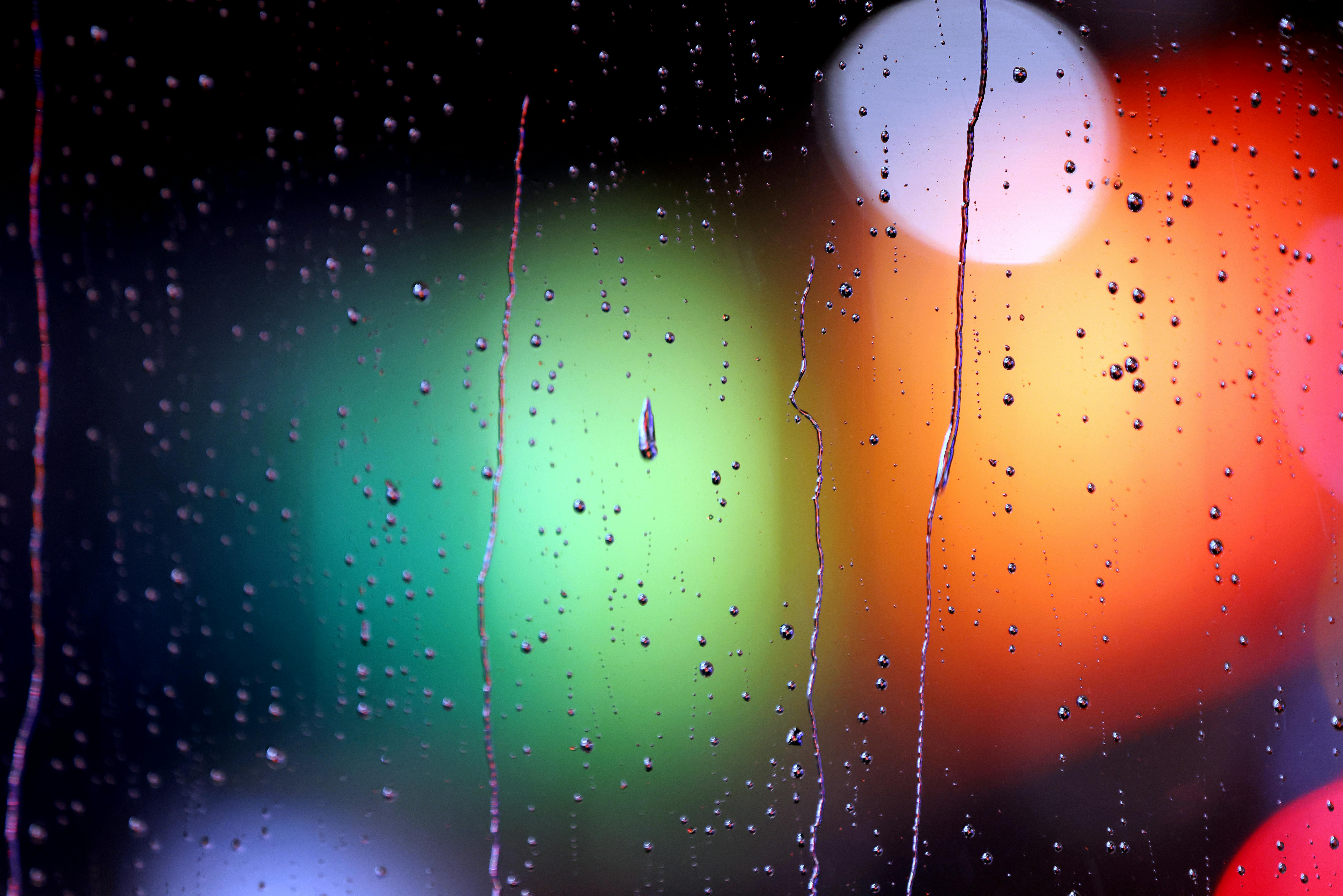 Colorful Raindrops on Window with Bokeh · Free Stock Photo