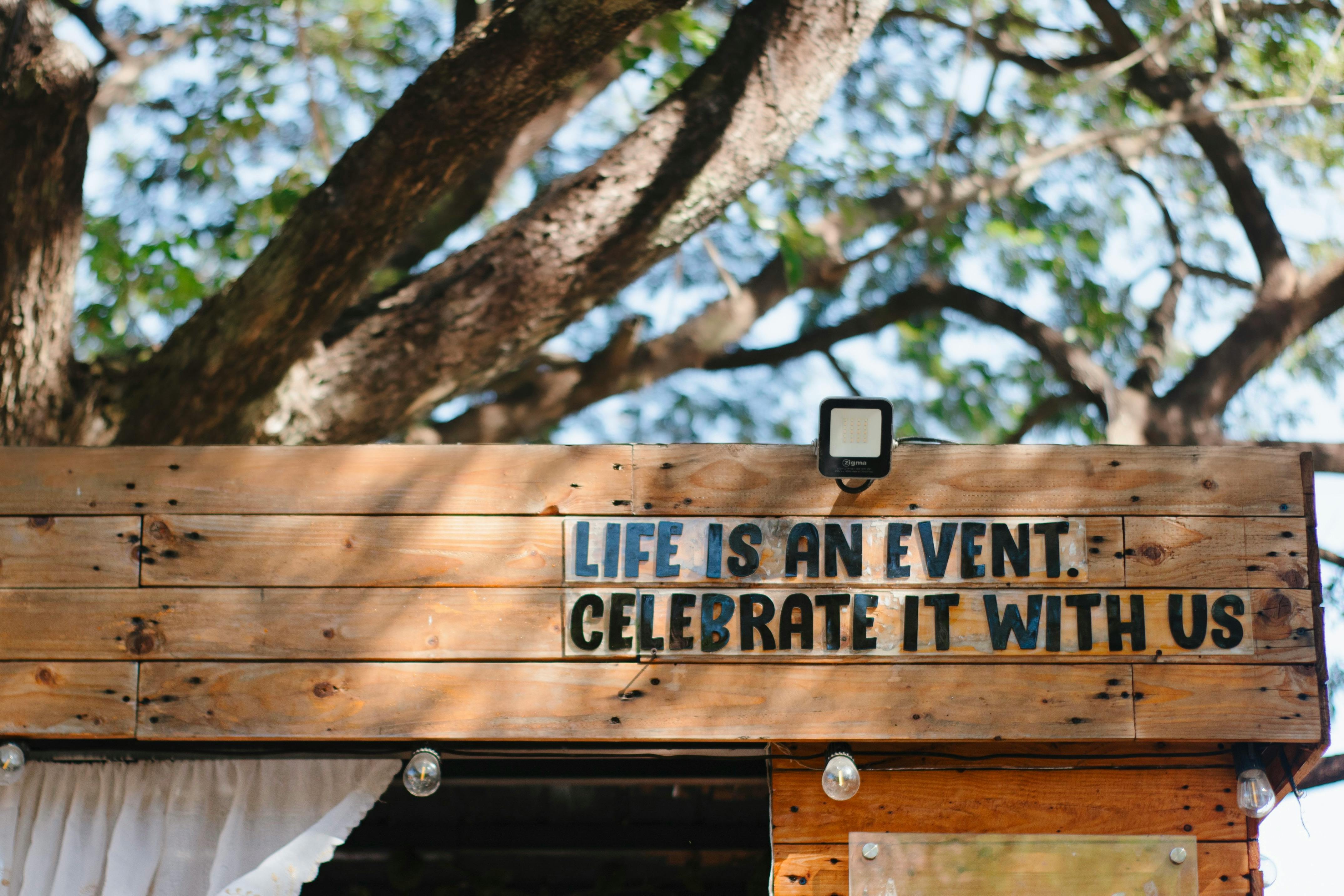 Wooden Sign with Event Celebration Message · Free Stock Photo