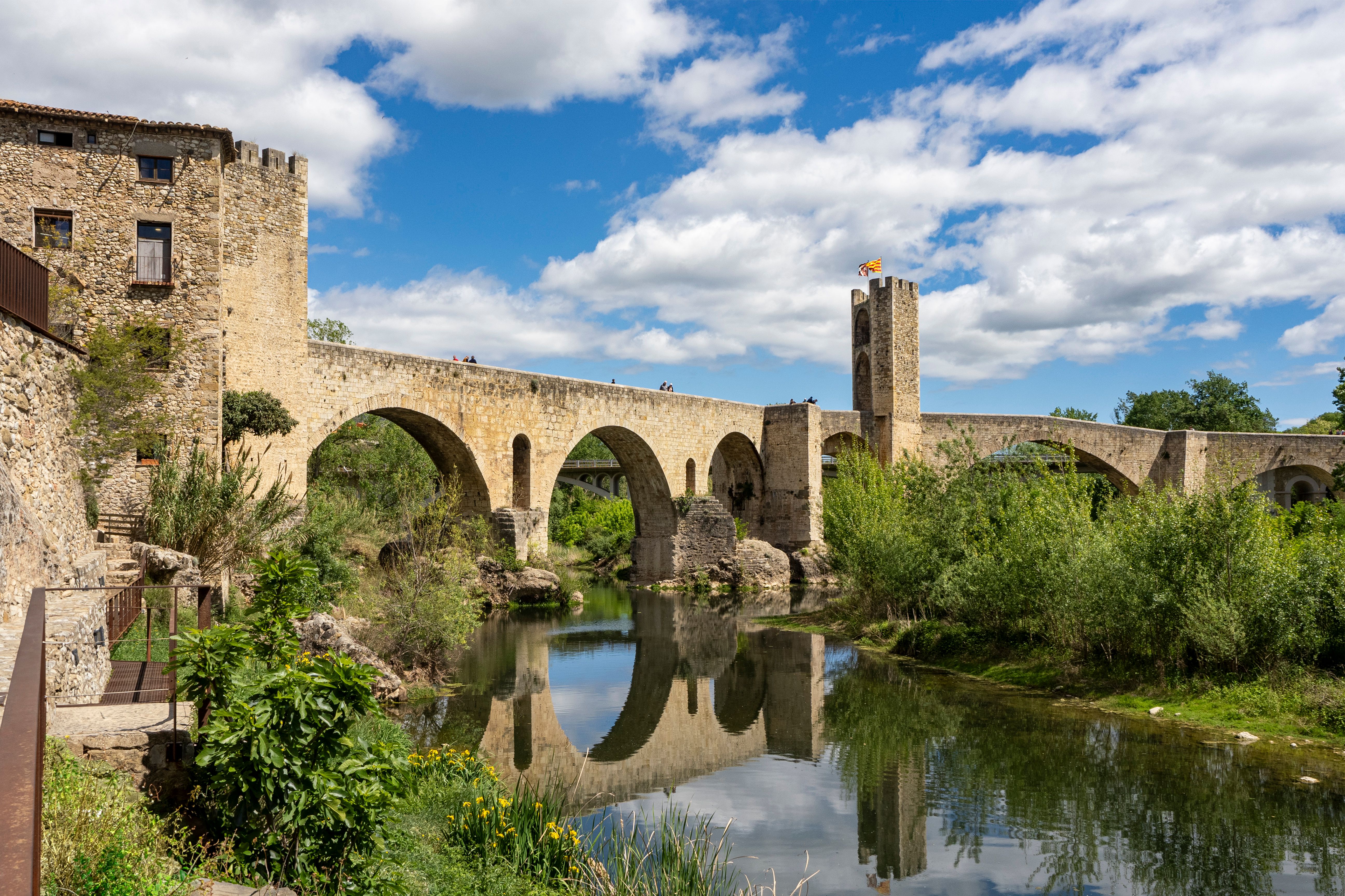 Medieval Stone Bridge Over Calm River · Free Stock Photo