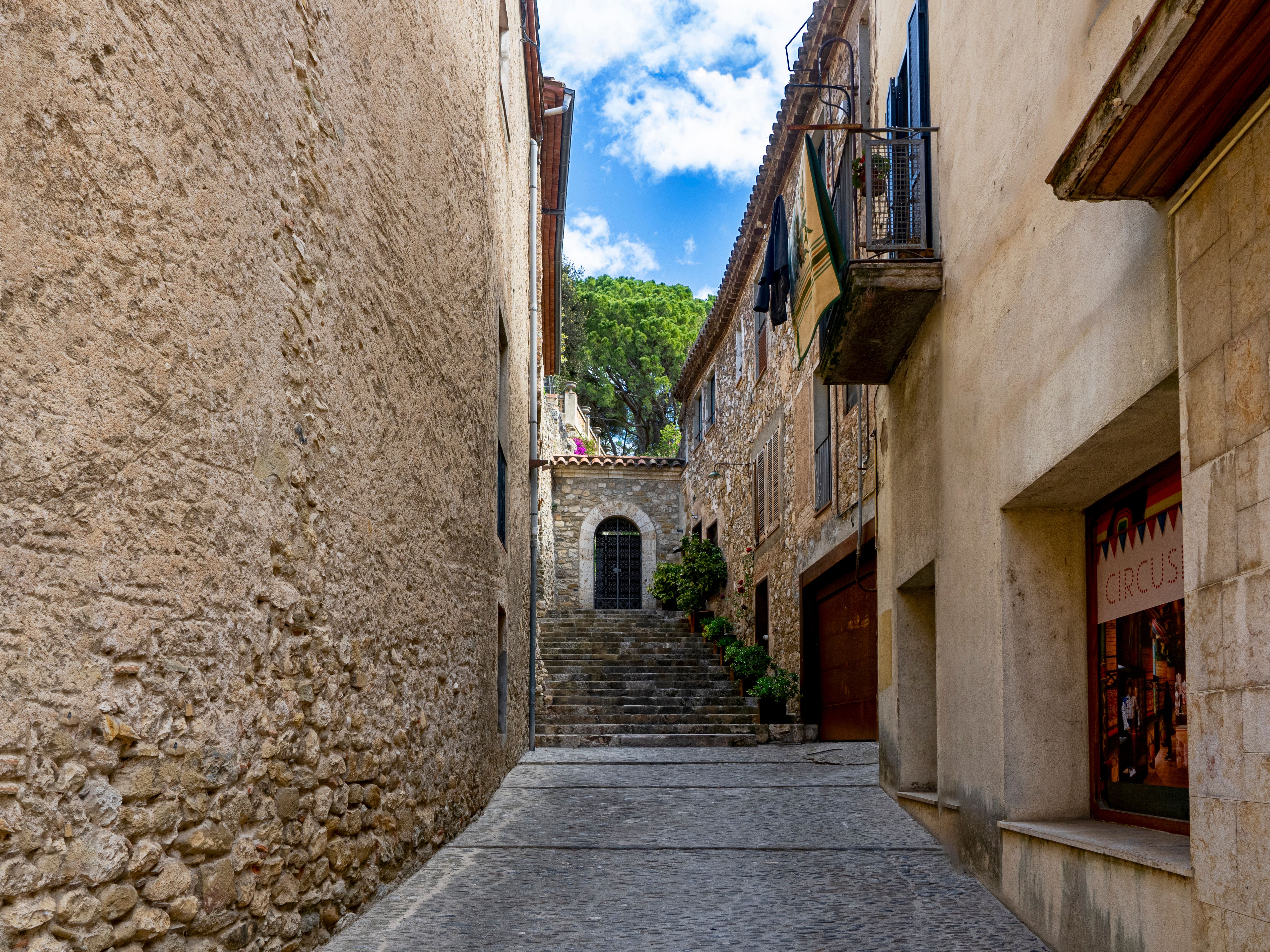 Charming Medieval Village Alley with Stone Walls · Free Stock Photo