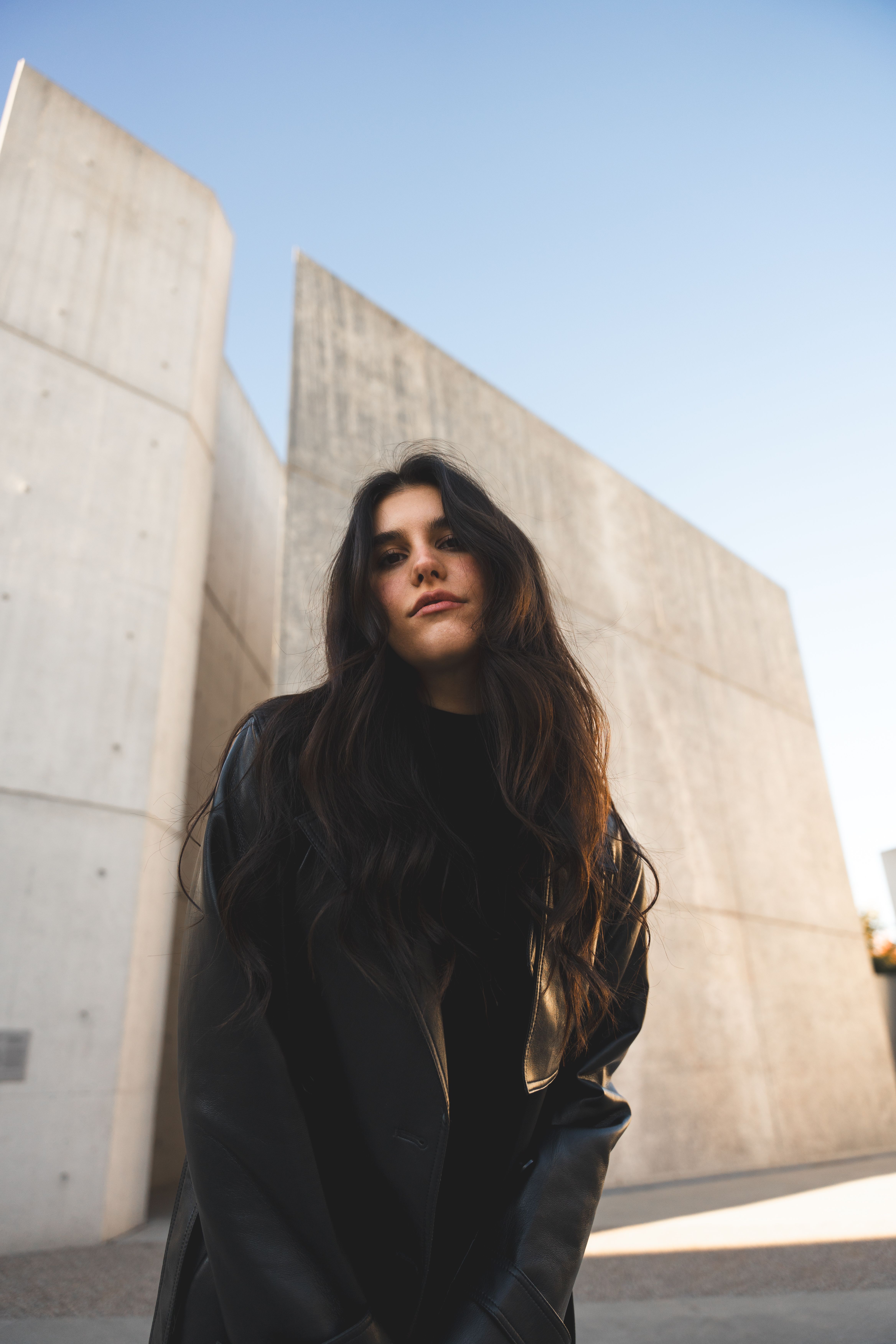 Modern Fashion Portrait with Concrete Architecture · Free Stock Photo