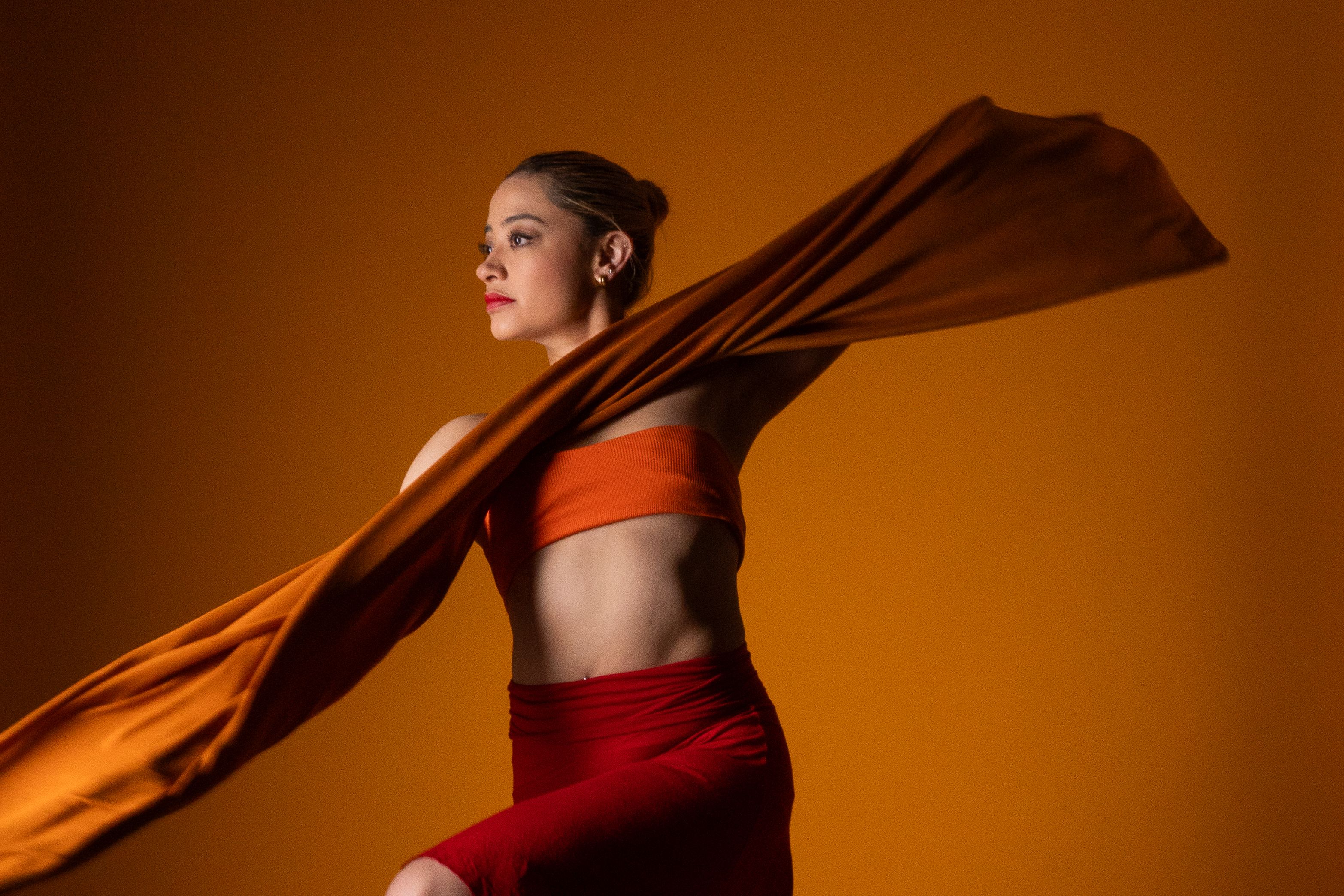 Dynamic Female Dancer in Vibrant Colors · Free Stock Photo