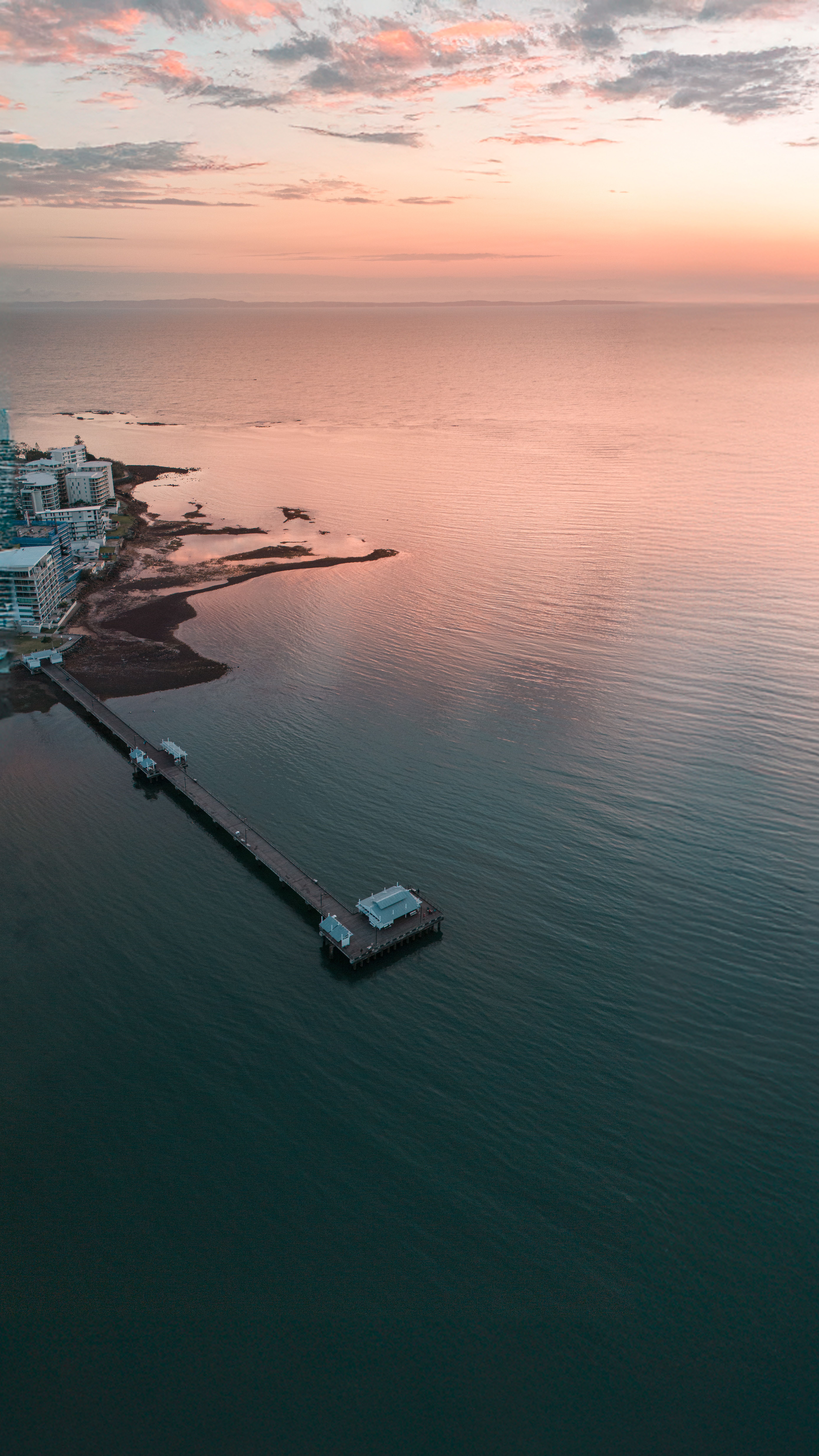 Aerial View of Woody Point Pier at Sunset · Free Stock Photo