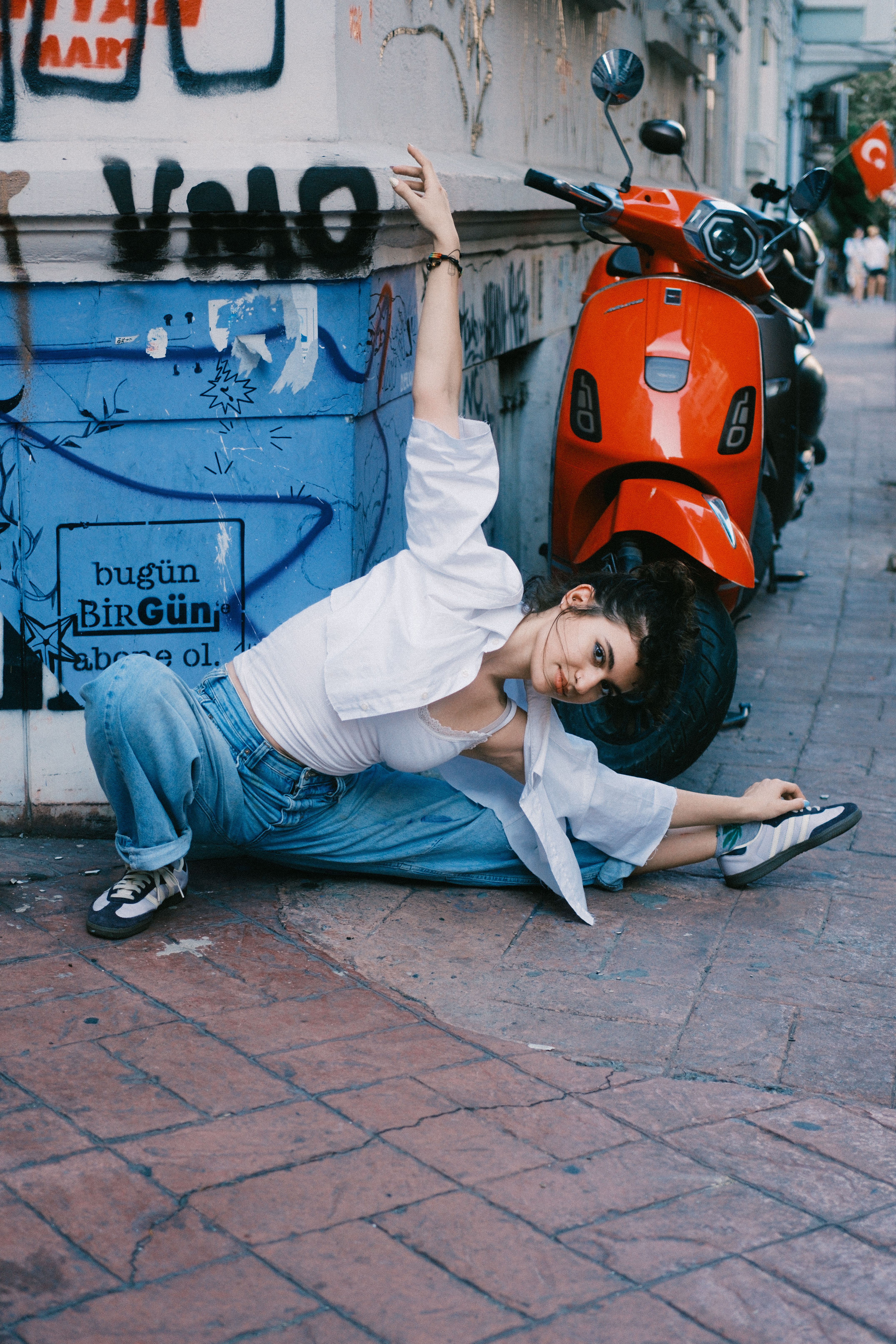 Street Dancer Performing in Urban Alleyway with Scooter · Free Stock Photo