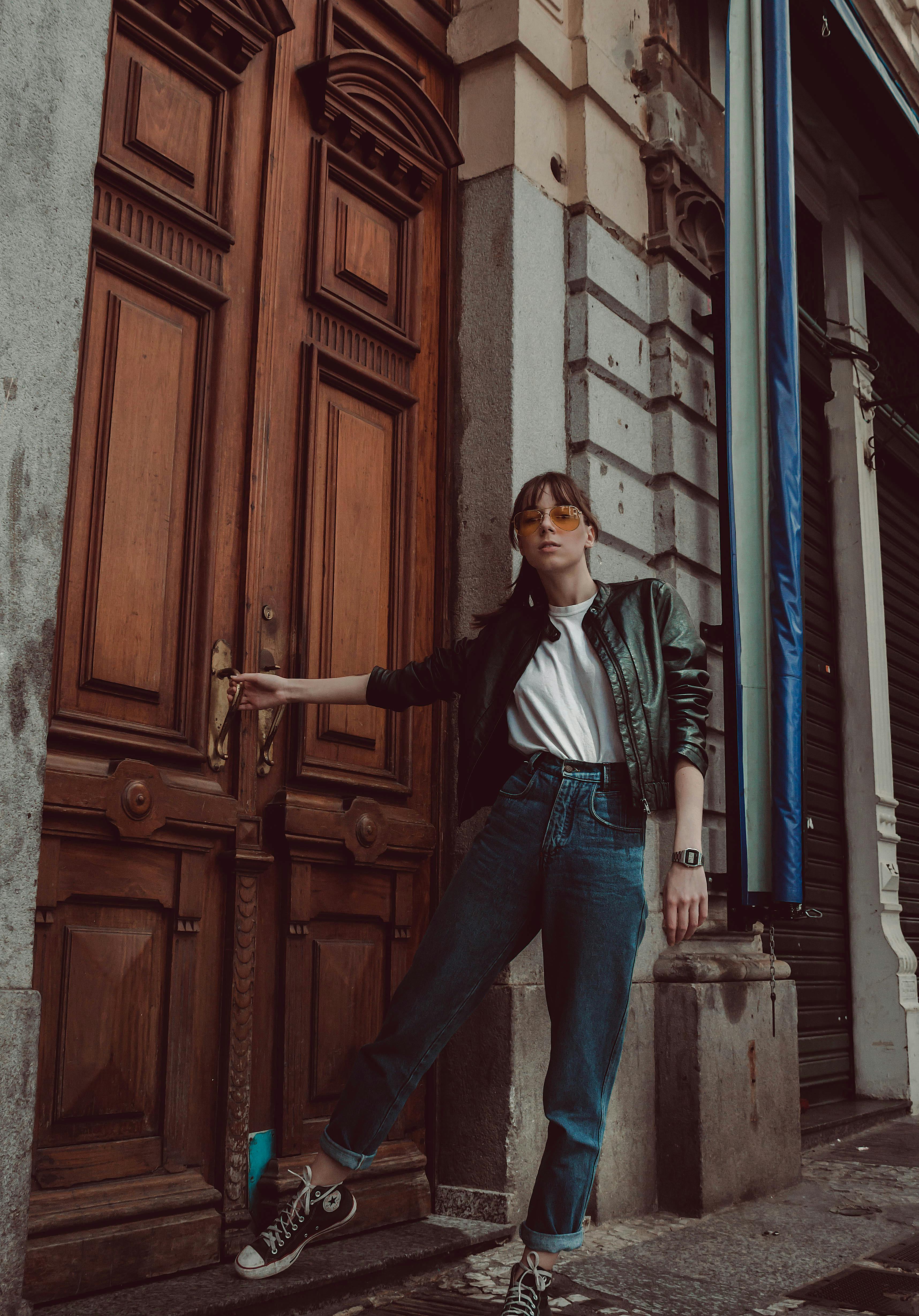 Woman Holding Wooden Door · Free Stock Photo