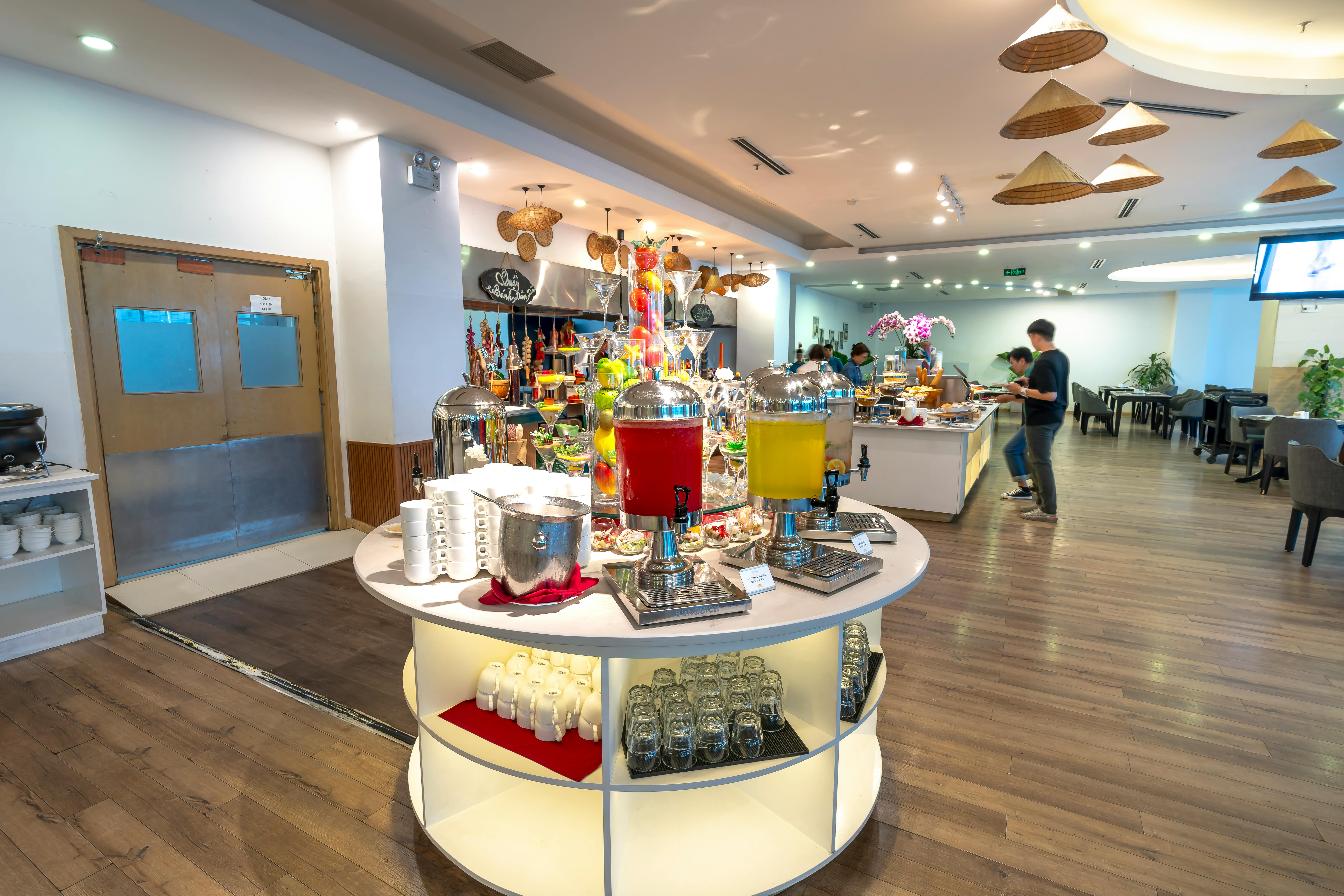 Modern Hotel Buffet with Refreshment Station · Free Stock Photo