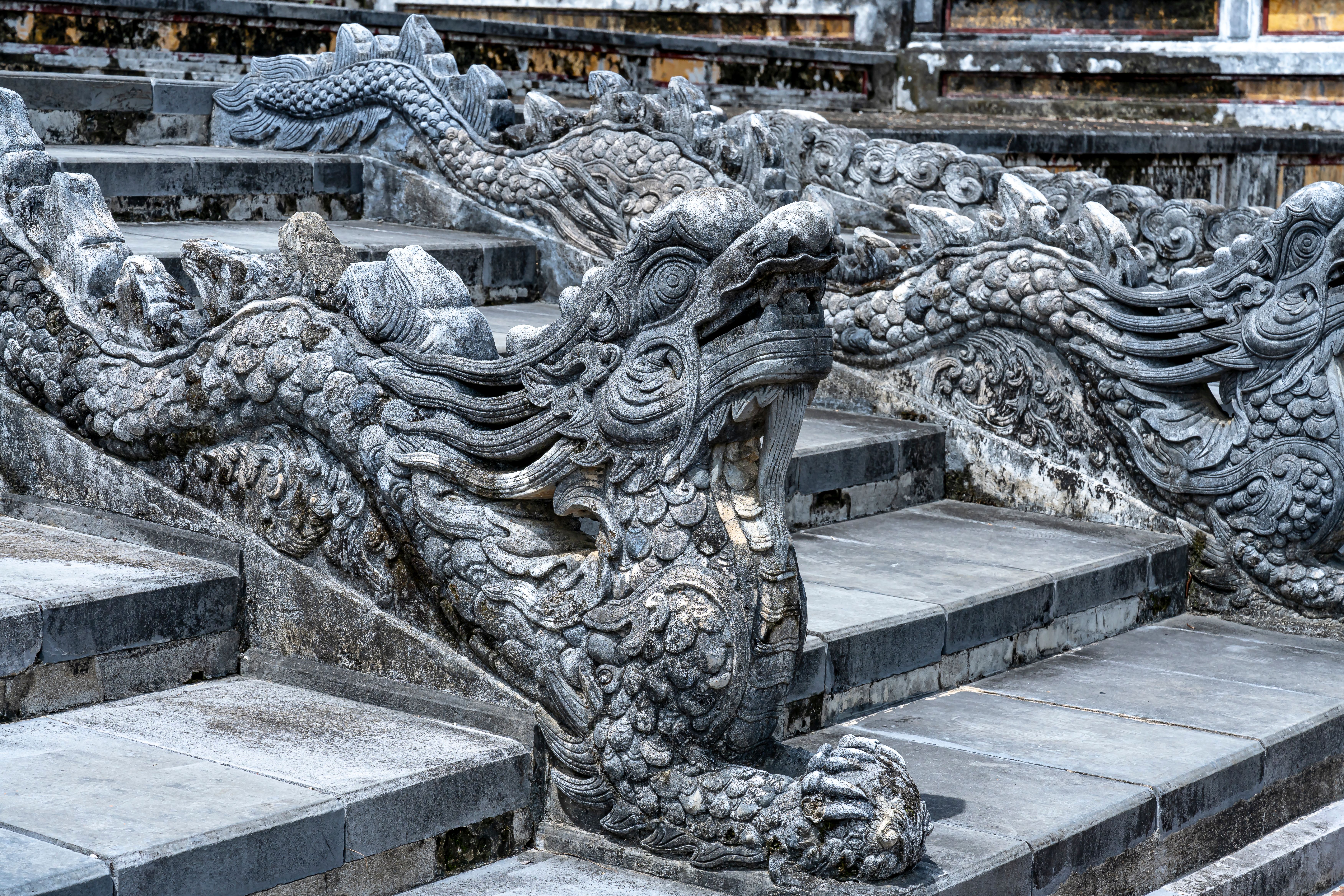 Intricate Stone Dragon Sculpture on Historic Staircase · Free Stock Photo
