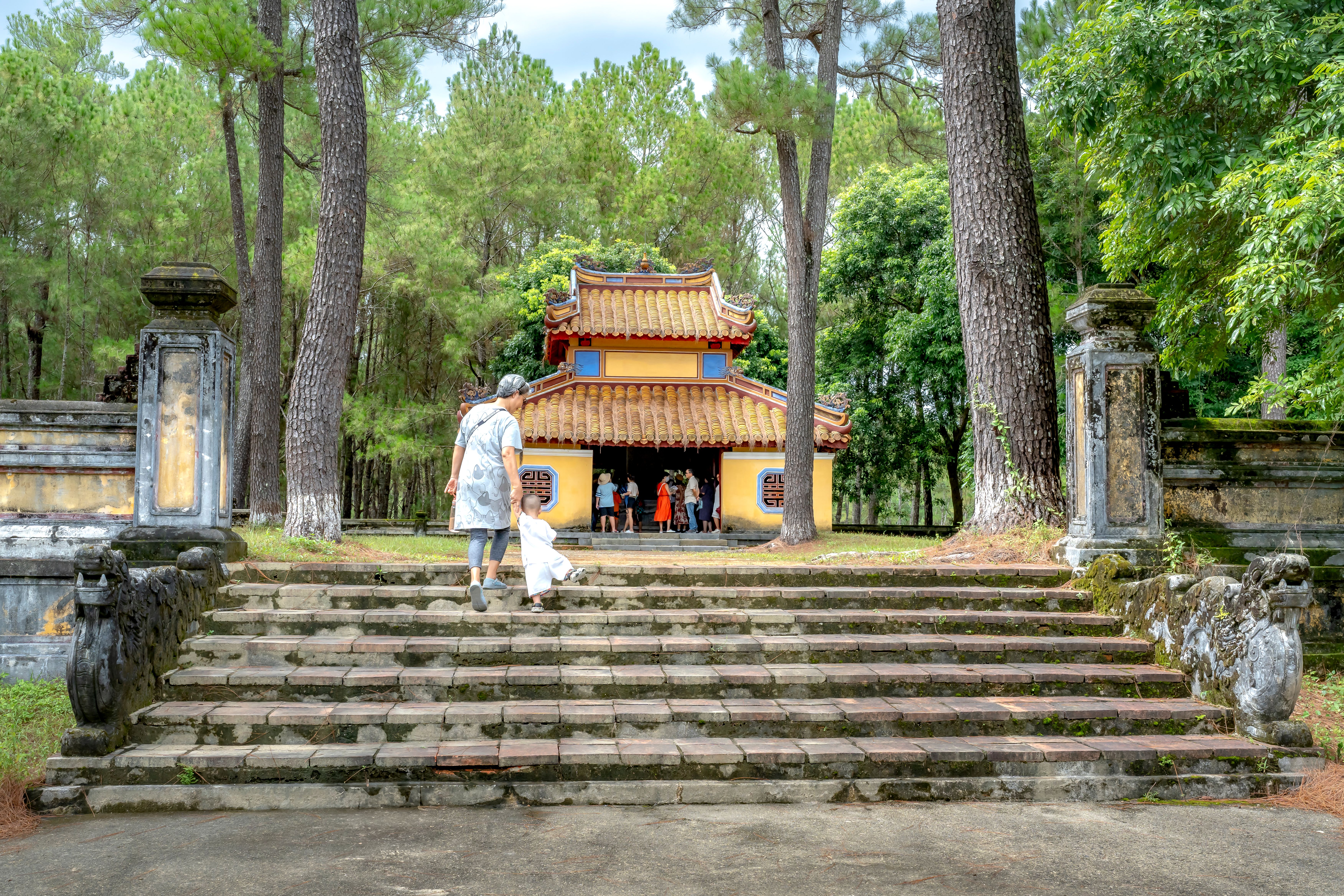 Visitors at Ancient Vietnamese Temple Steps · Free Stock Photo