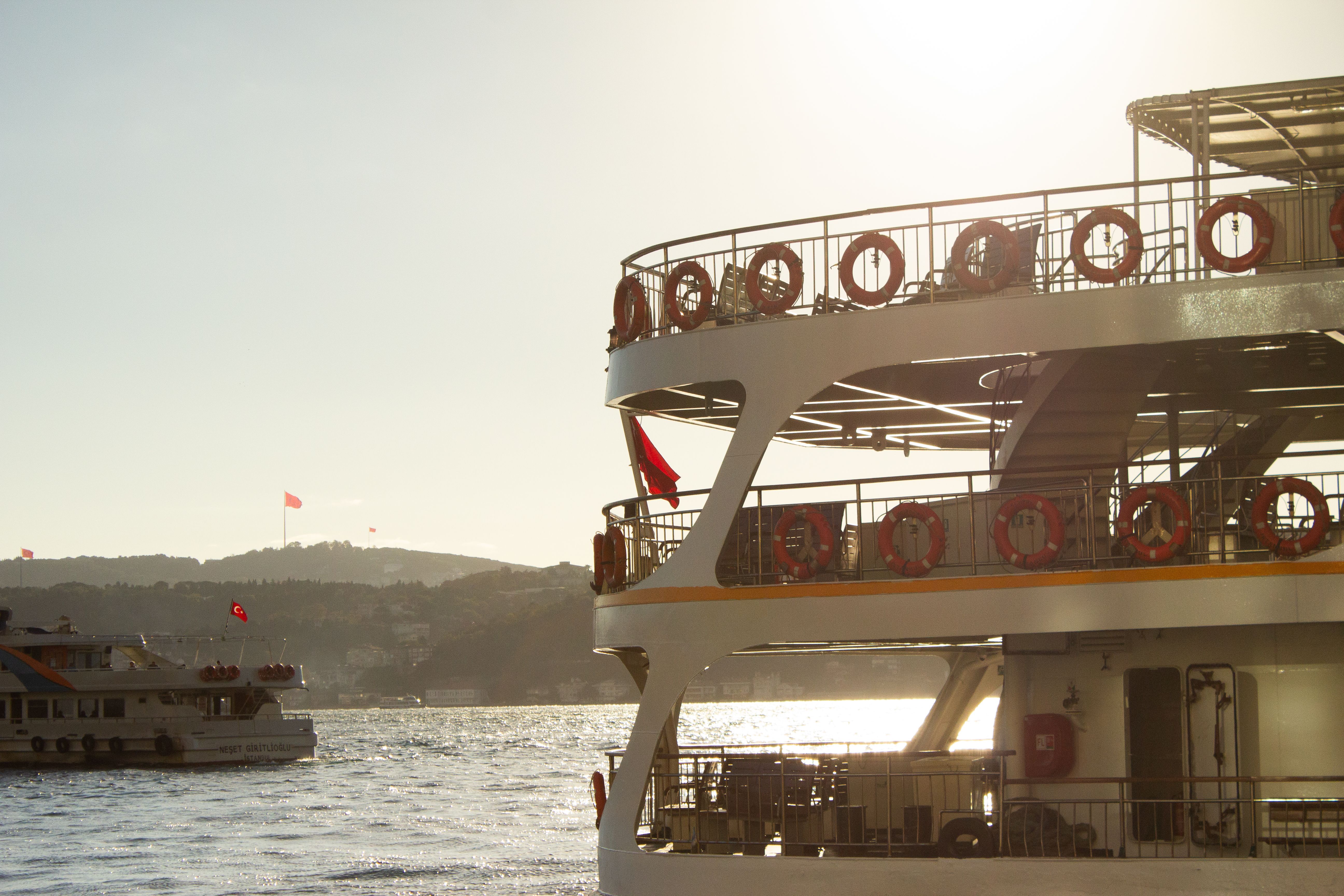 Sunlit Ferry on Scenic Bosphorus Strait · Free Stock Photo