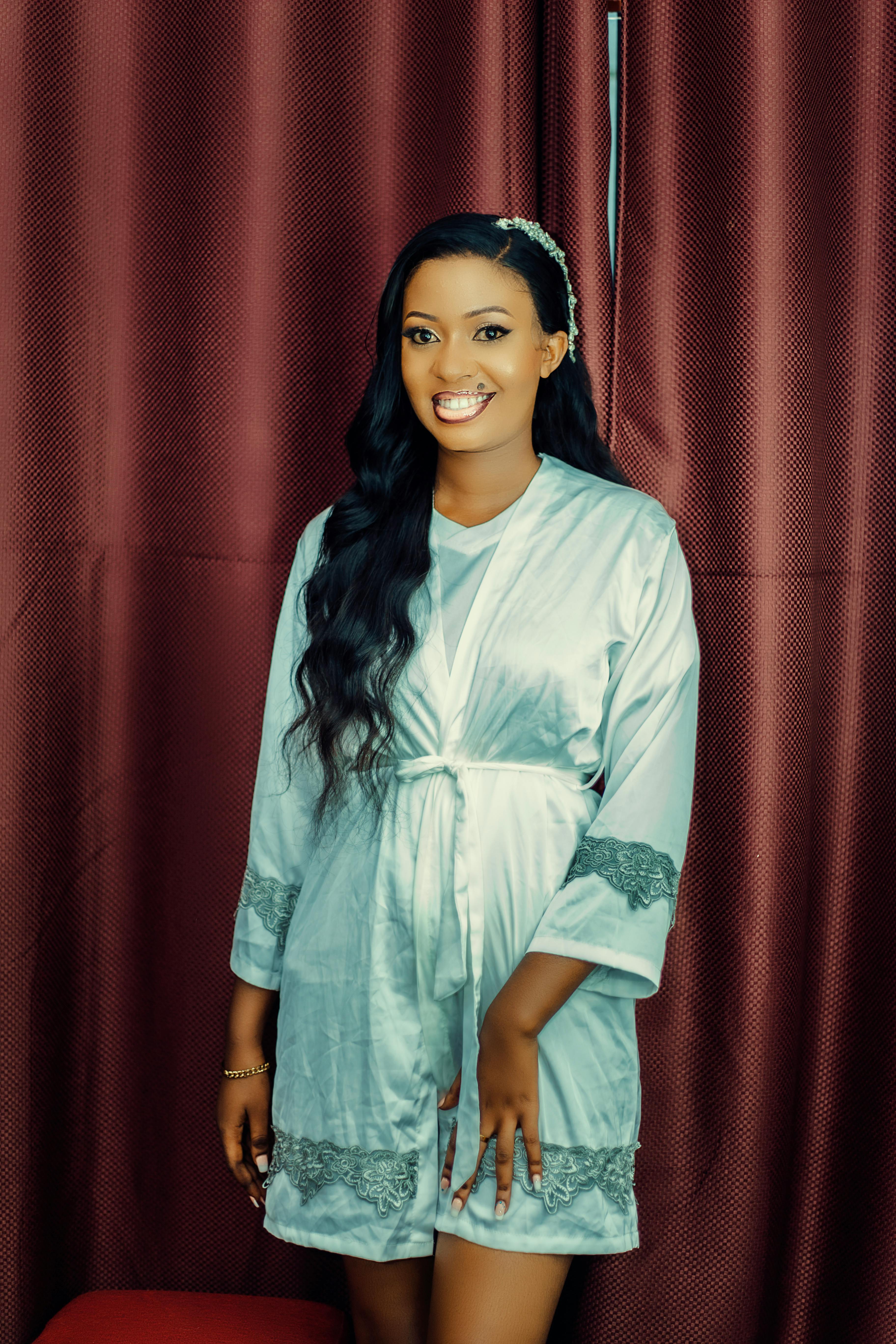 Elegant Portrait of Smiling Woman in Silk Robe · Free Stock Photo