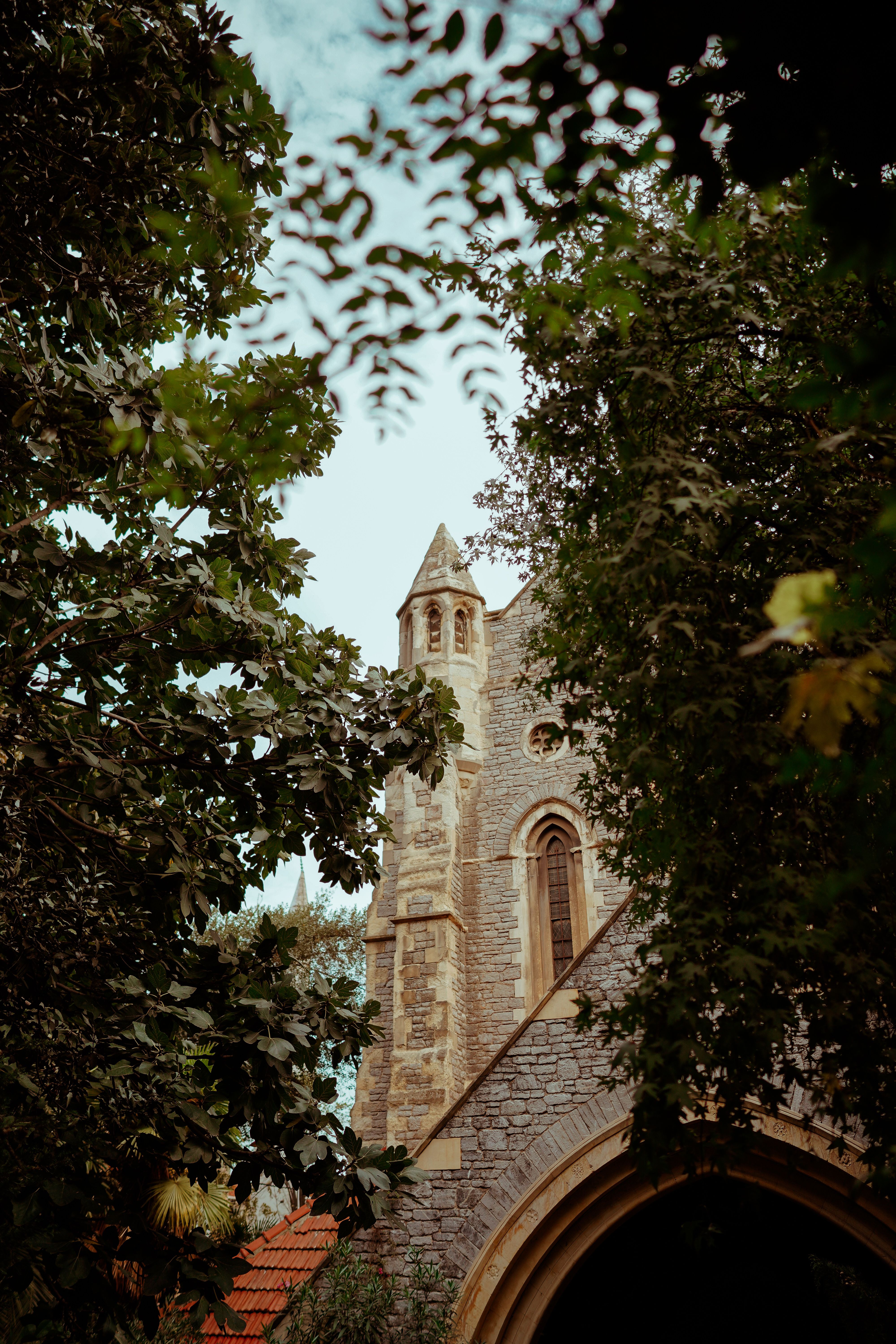 Historic Stone Church Amidst Lush Greenery · Free Stock Photo