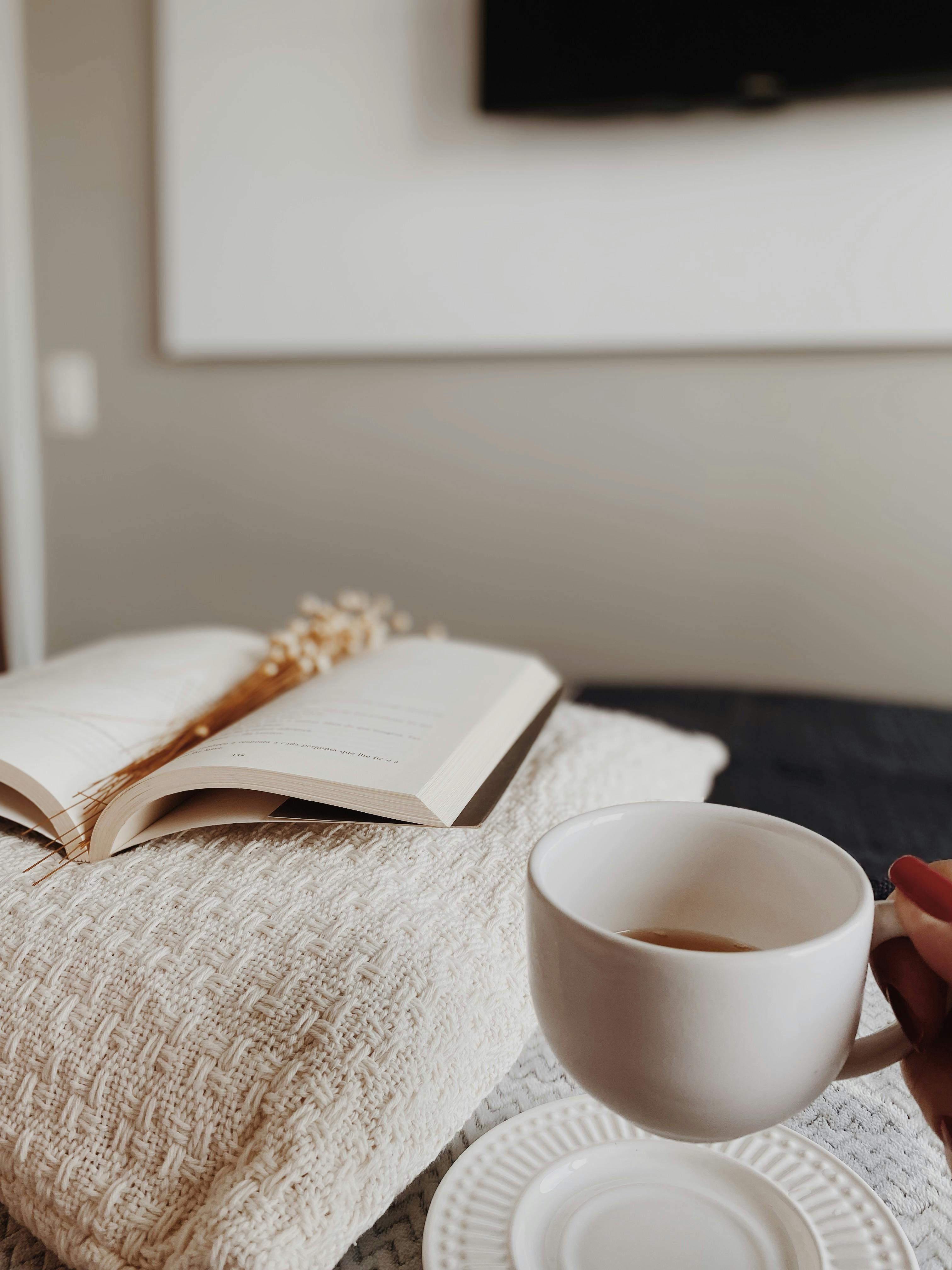 Cozy Reading with Coffee in São Paulo Living Room · Free Stock Photo