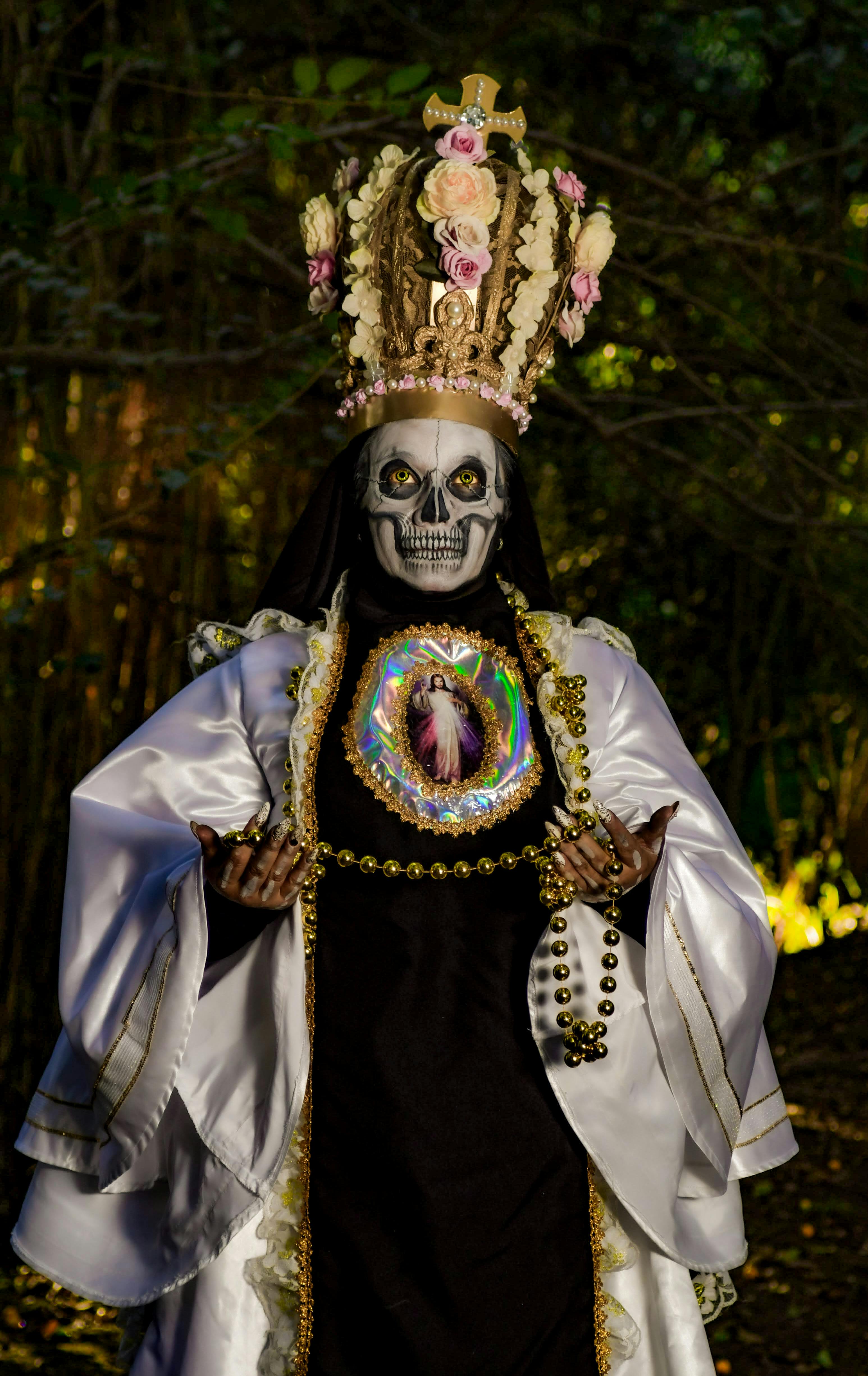 Elaborate Skeleton Costume in Forest Setting · Free Stock Photo