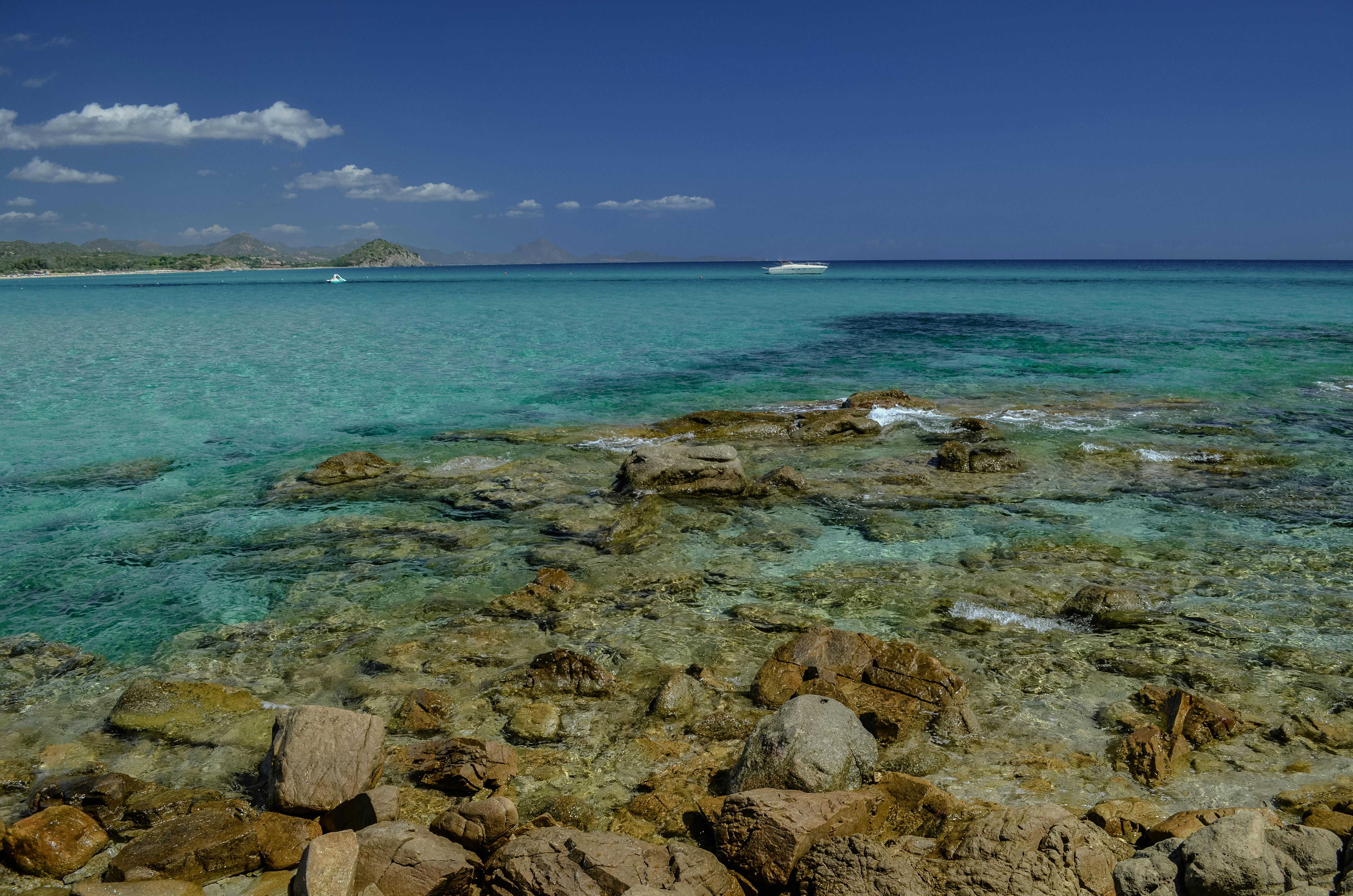 Pristine Sardinian Beach with Crystal Clear Water · Free Stock Photo