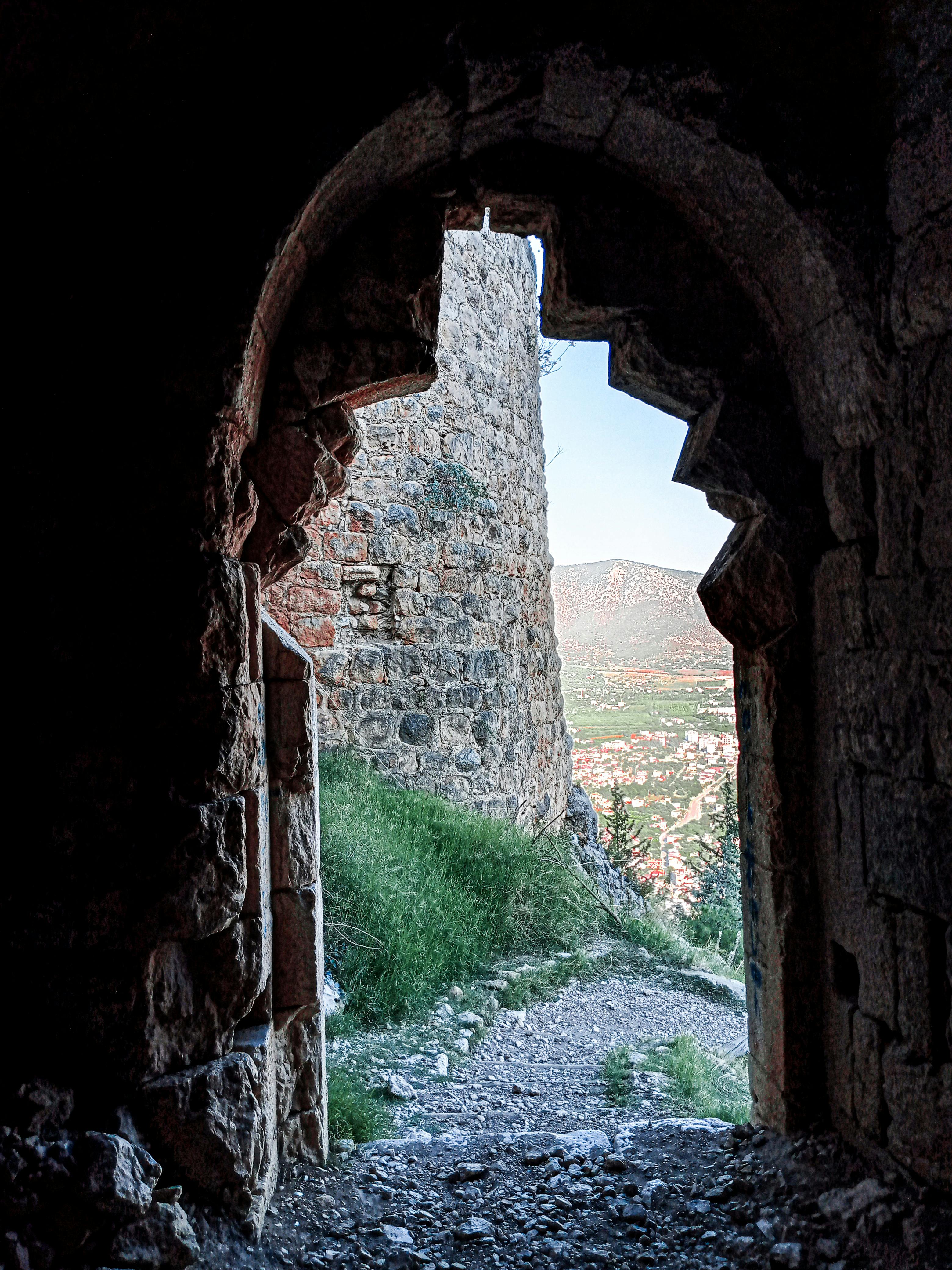 Ancient Stone Archway with Scenic Mountain View · Free Stock Photo