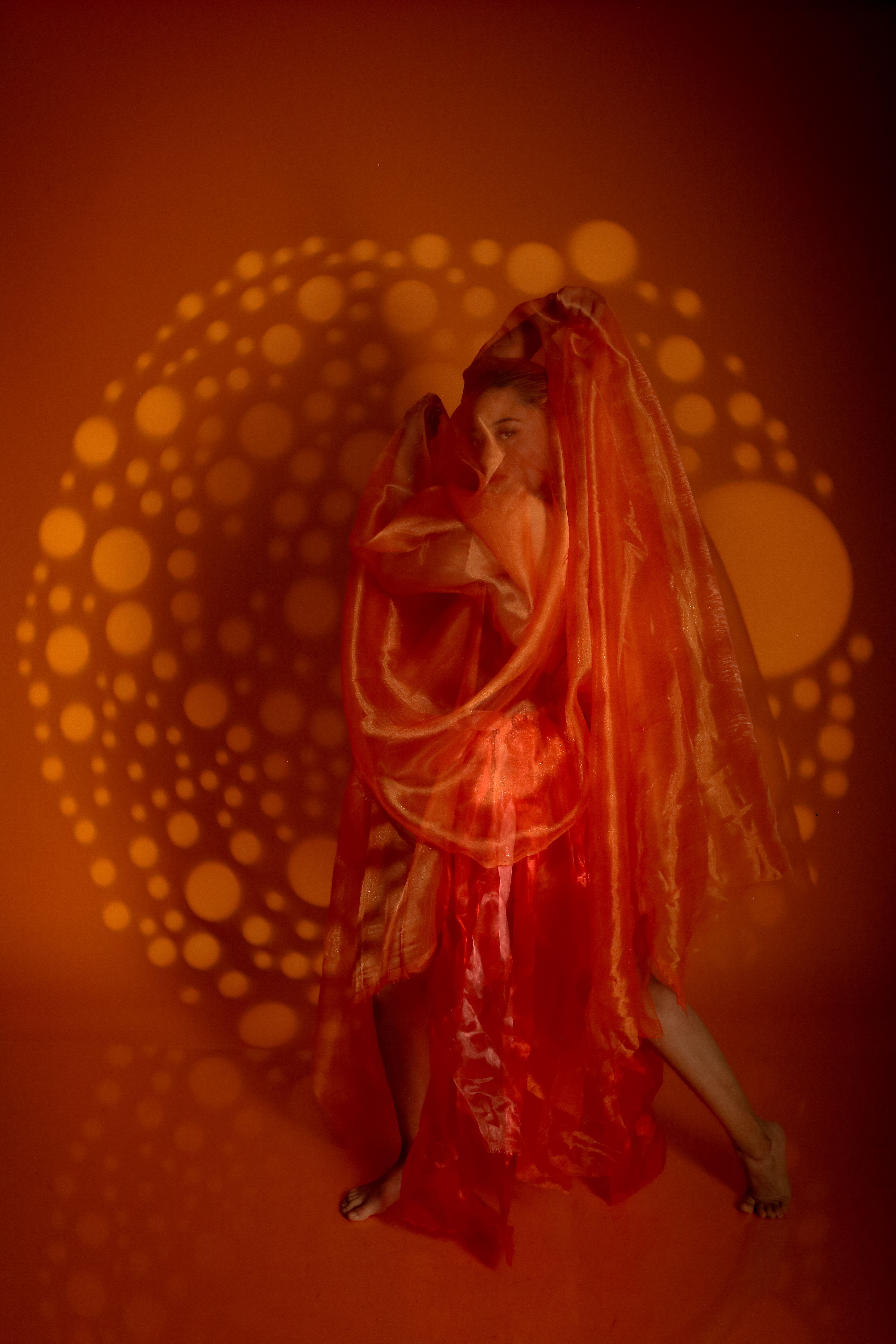 Artistic Portrait with Orange Fabric and Dramatic Lighting · Free Stock ...