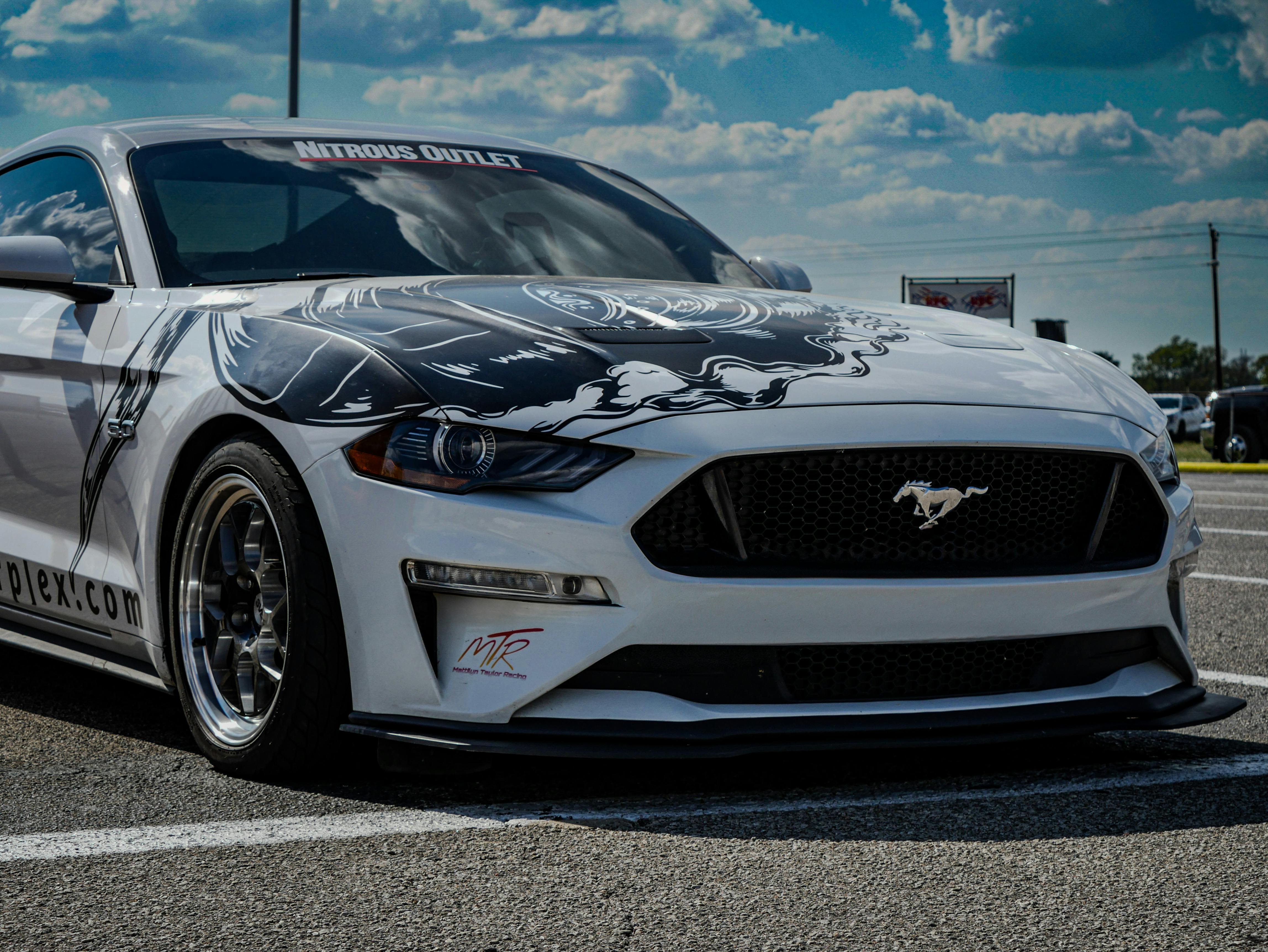 White Ford Mustang with Custom Decals in Ennis, TX · Free Stock Photo