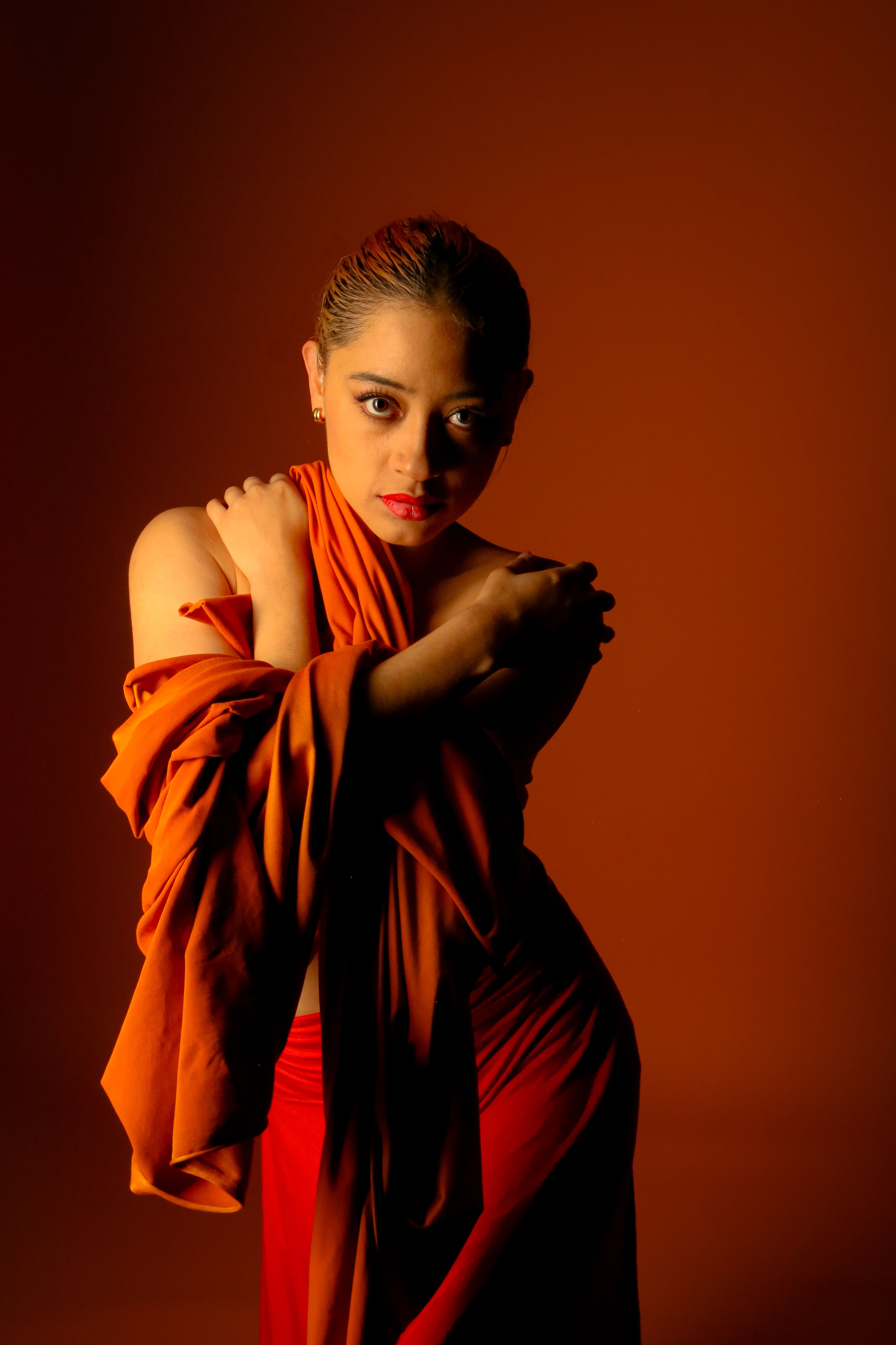 Portrait of a Woman in Dramatic Lighting · Free Stock Photo
