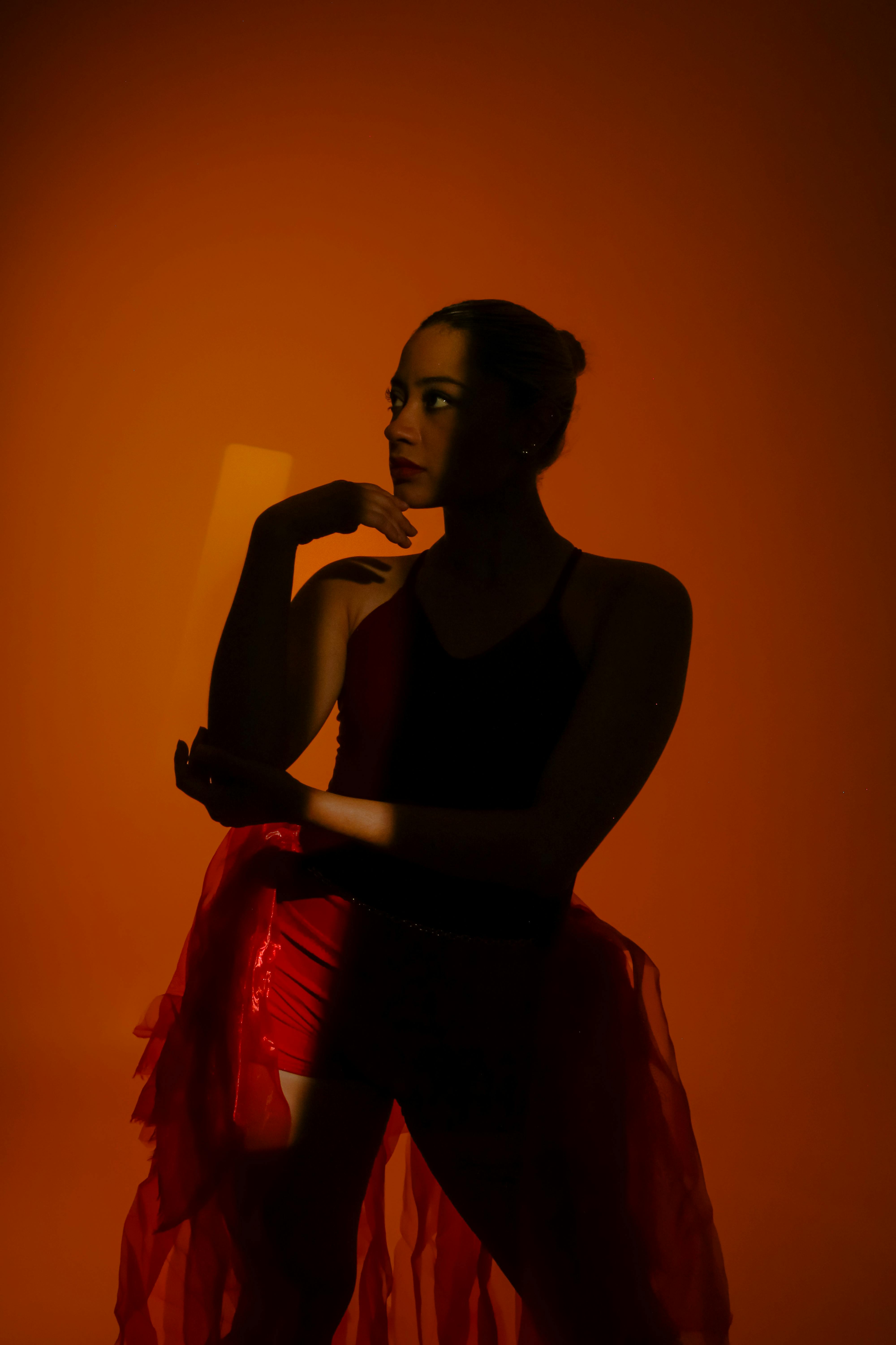 Elegant Silhouette of a Dancer in Dramatic Lighting · Free Stock Photo