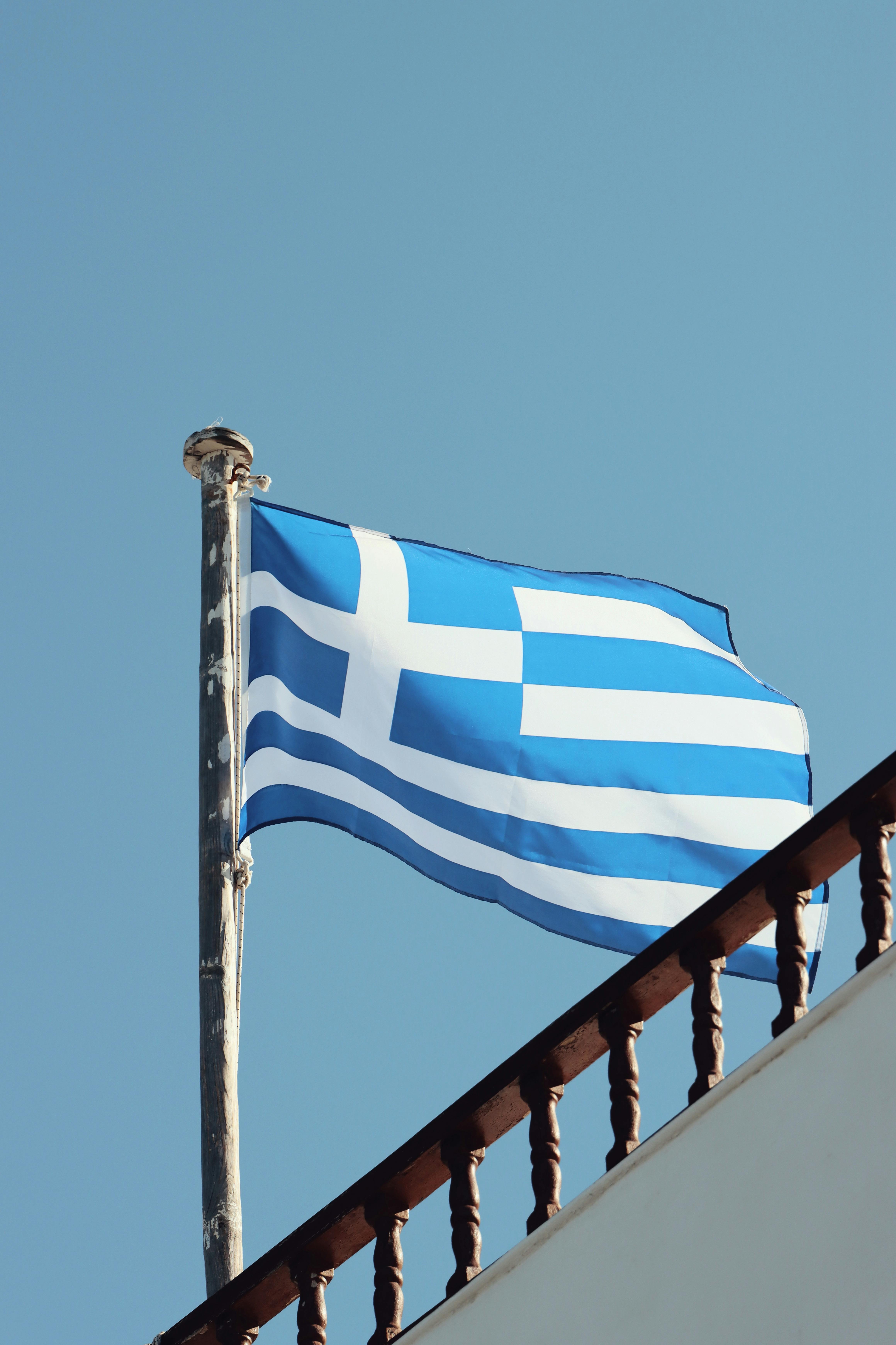 Greek Flag on a Sunny Day in Naxos · Free Stock Photo