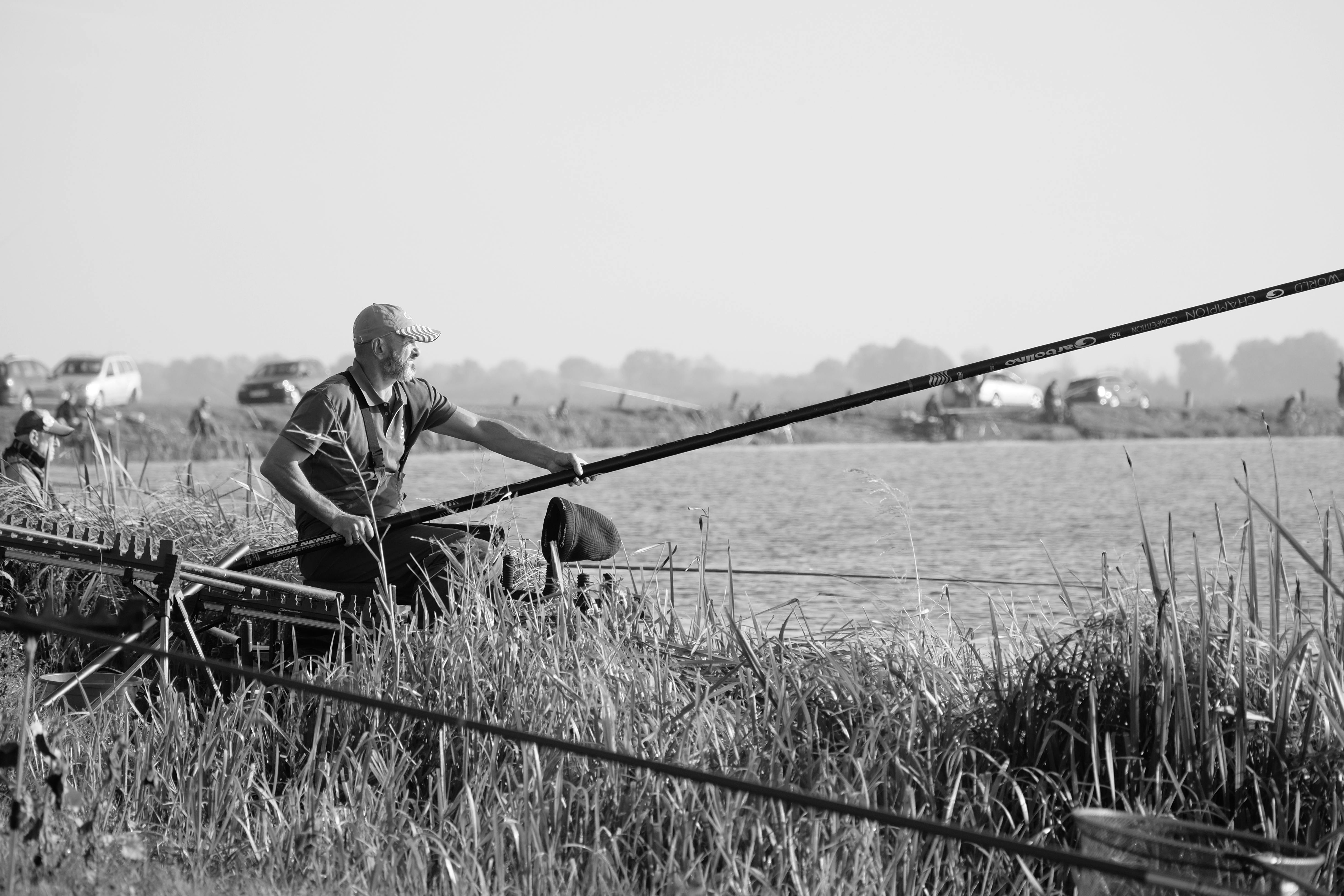 Monochrome Lakeside Fishing Experience · Free Stock Photo