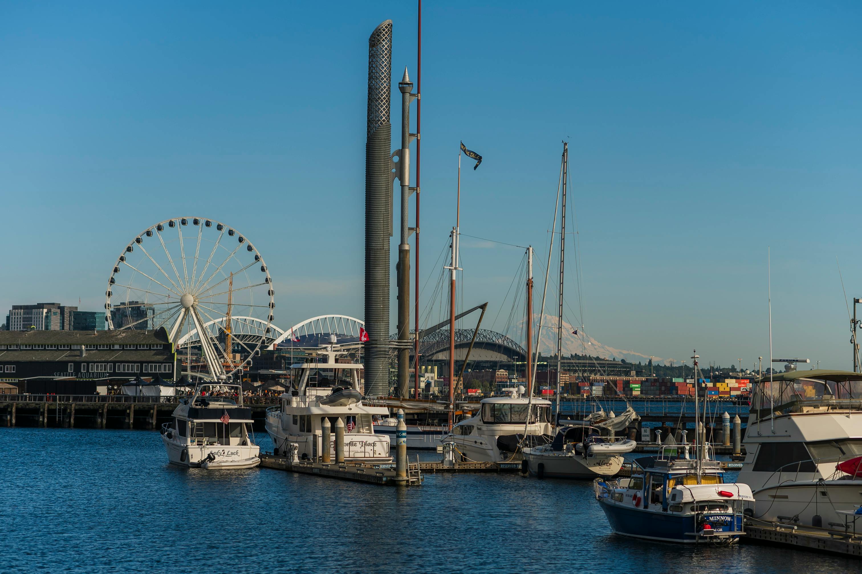 Scenic Seattle Waterfront With Ferris Wheel and Boats · Free Stock Photo