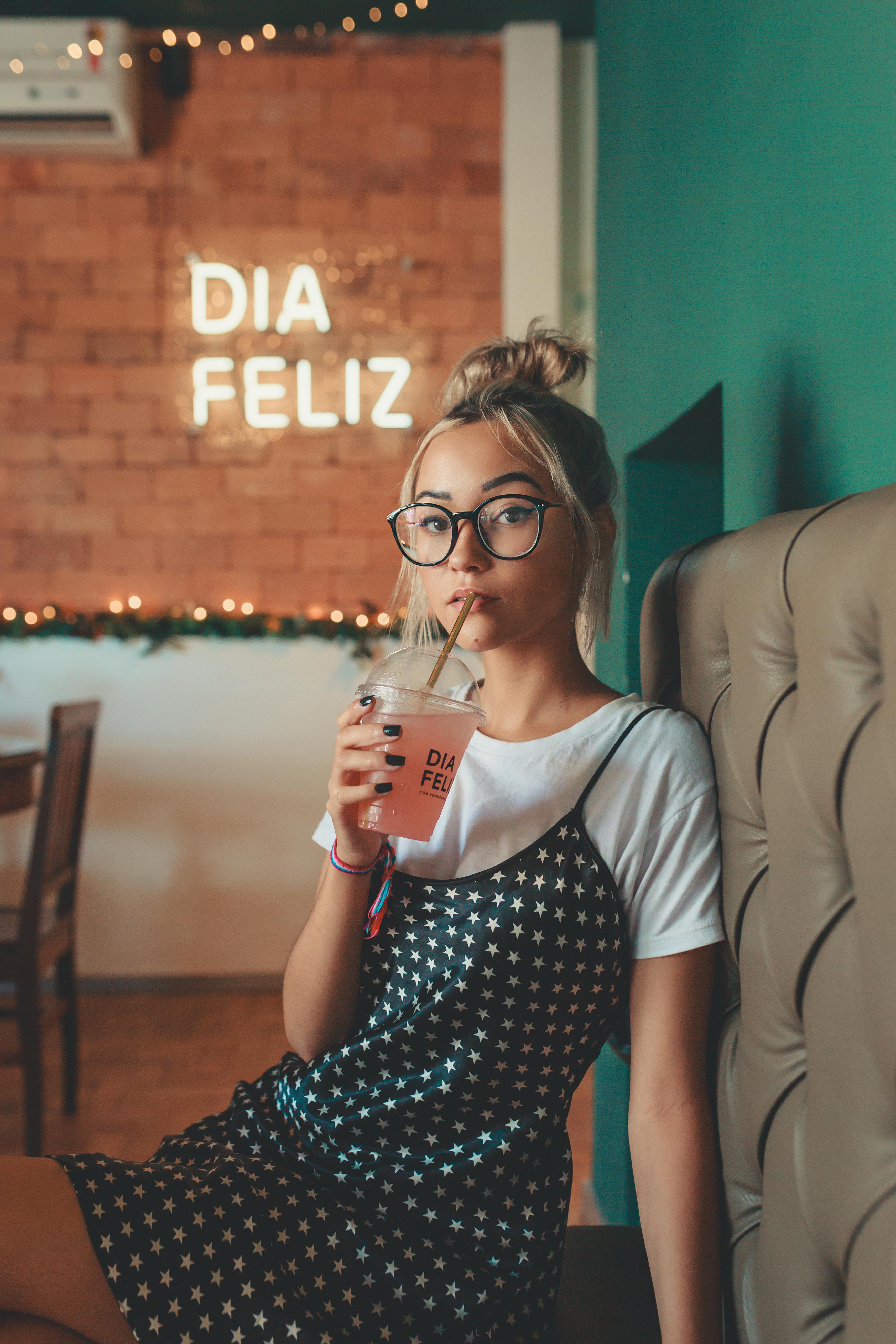 Woman Sipping from Cup · Free Stock Photo