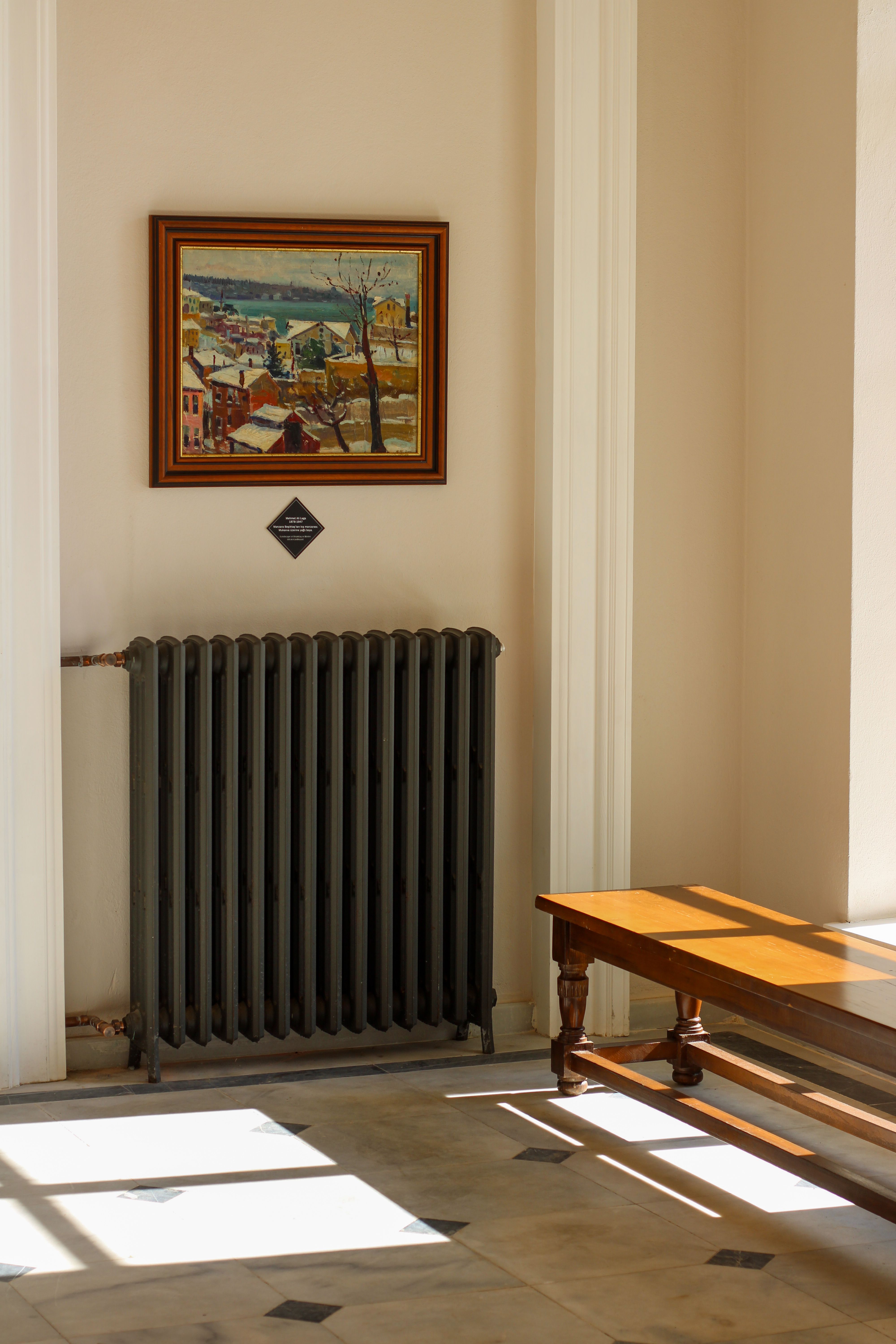 Sunlit Interior with Art and Radiator · Free Stock Photo